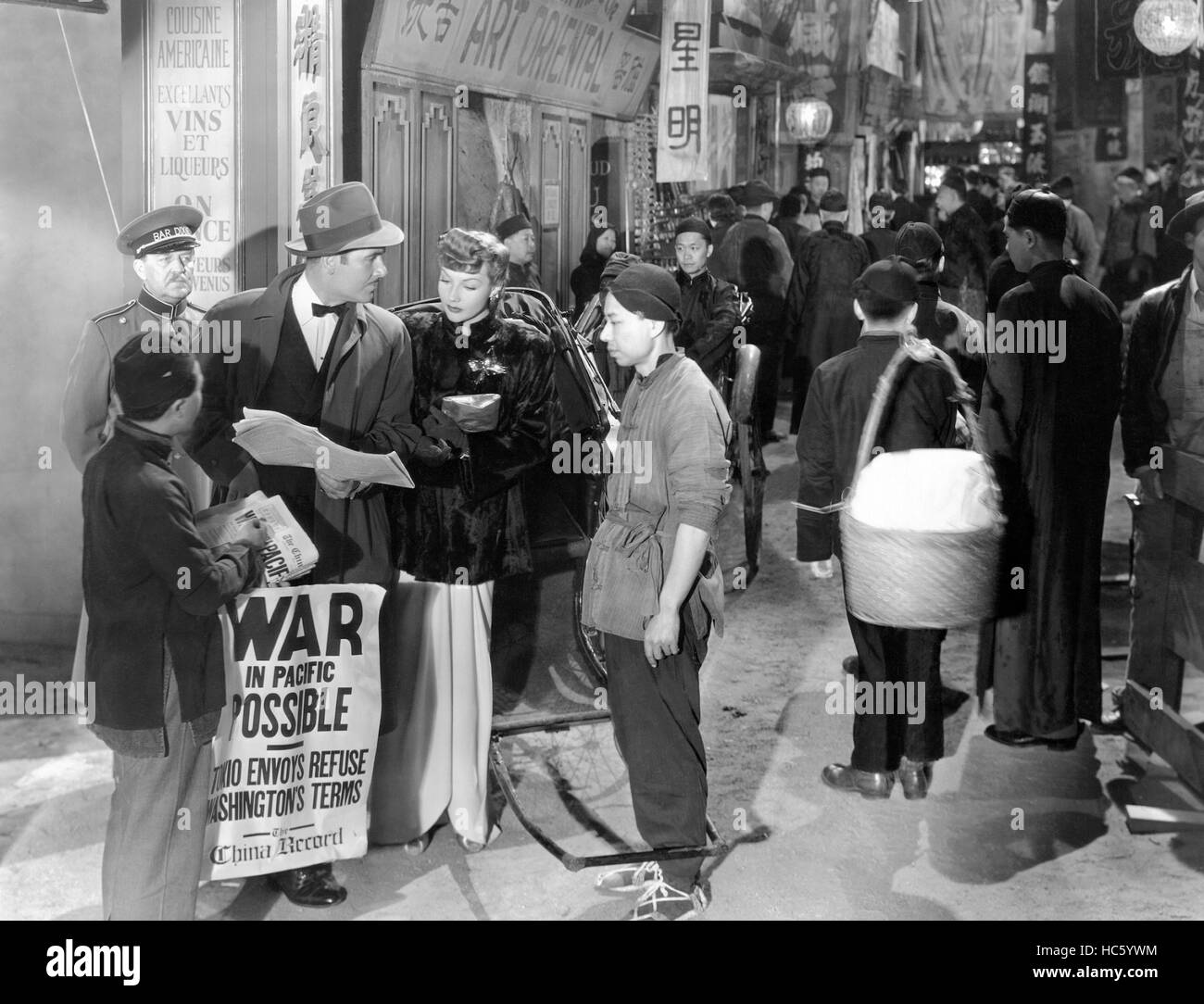 SECRET AGENT OF JAPAN, Preston Foster (holding newspaper), Lynn Bari ...