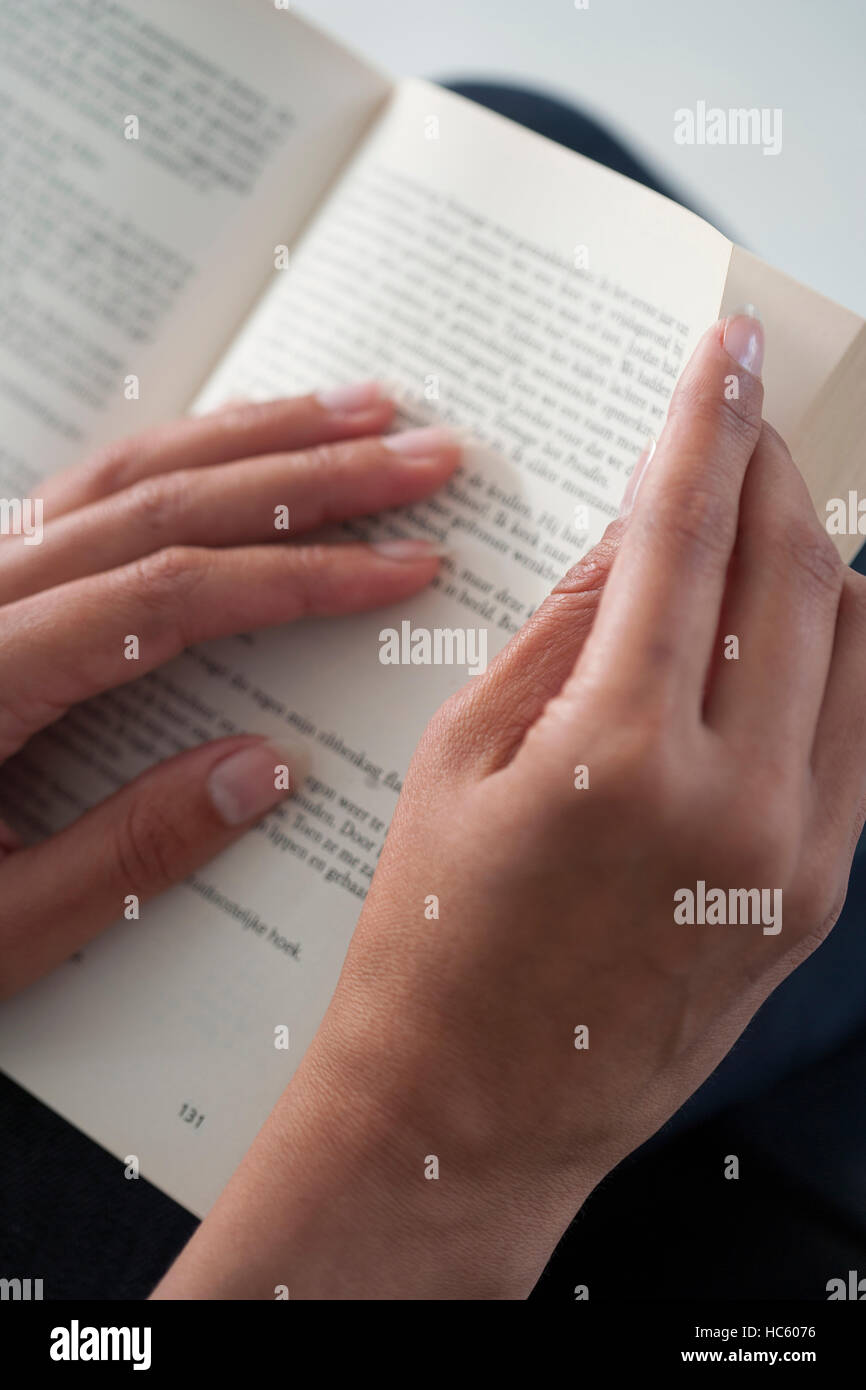 Close up hands with open book for reading concept background Stock ...