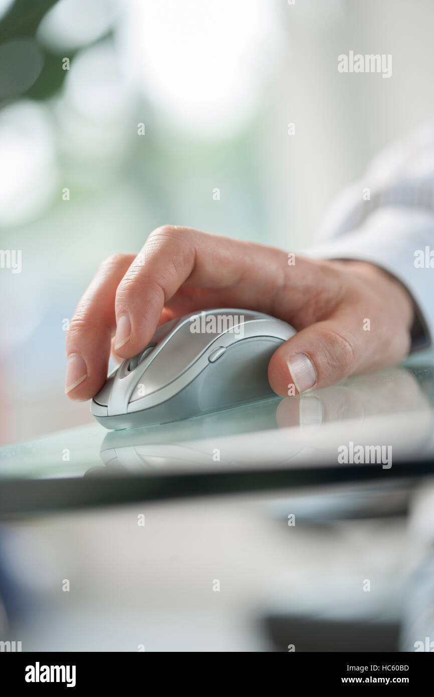 Woman hand clicking wireless mouse hi-res stock photography and images ...