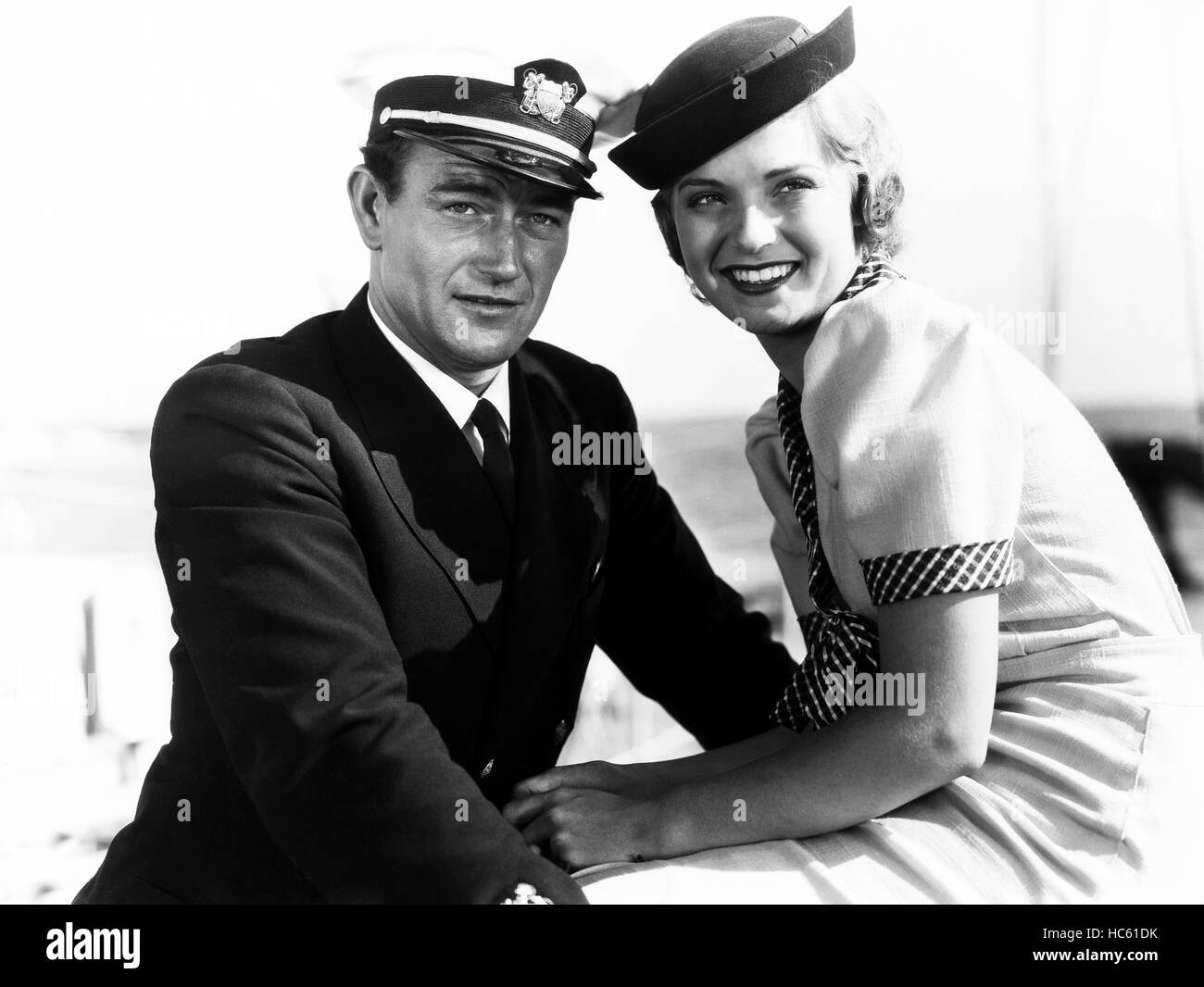 THE SEA SPOILERS, from left, John Wayne, Nan Grey, 1936 Stock Photo - Alamy