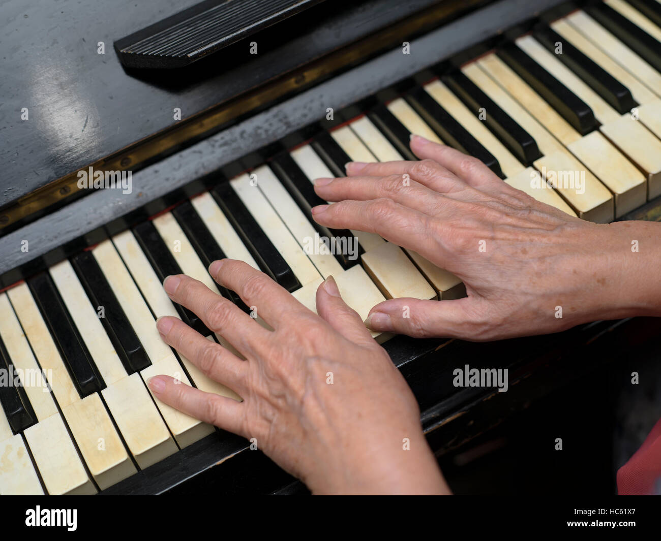 Female hands play piano keys hi-res stock photography and images - Alamy