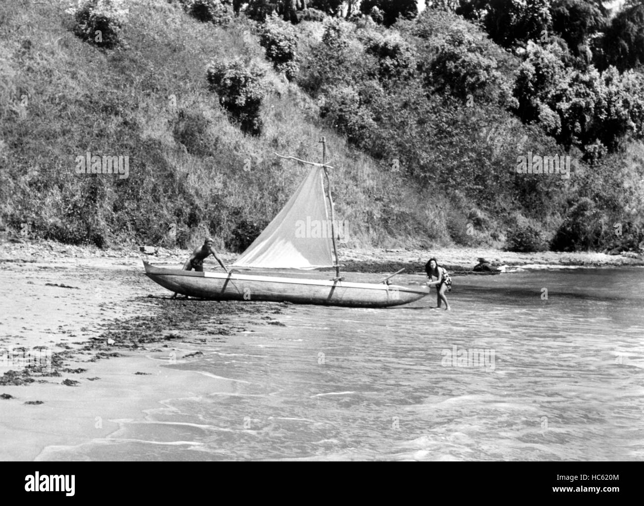 SHE GODS OF SHARK REEF, Bill Cord (l.), Lisa Montell (r.), 1958 Stock ...