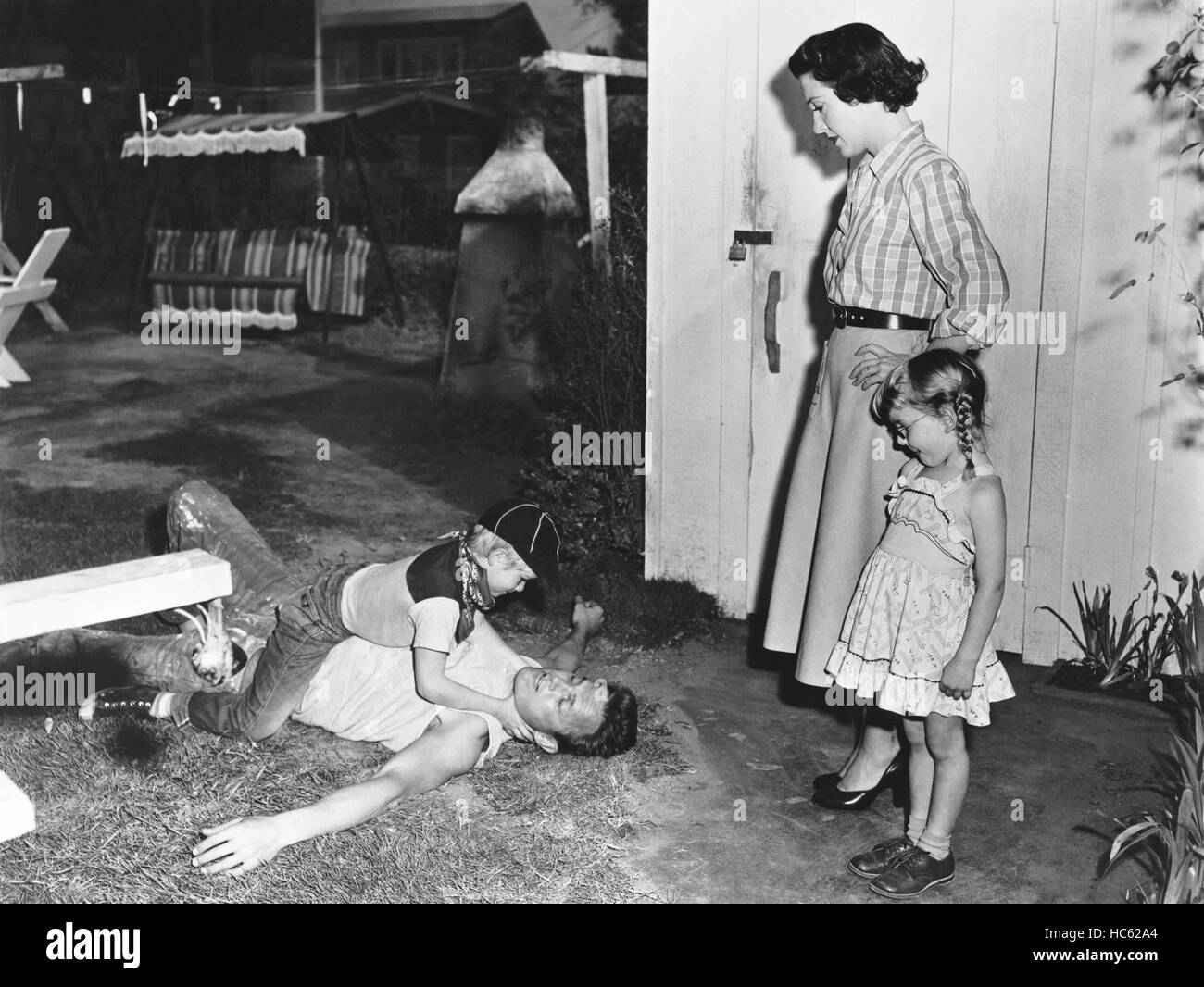 SHADOW IN THE SKY, from left, Dennis Ross, Ralph Meeker, Nancy Davis ...