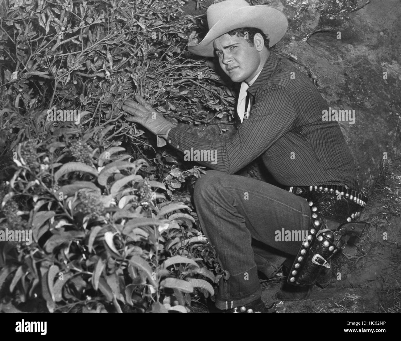 SHERIFF OF CIMARRON, Sunset Carson, 1945 Stock Photo - Alamy