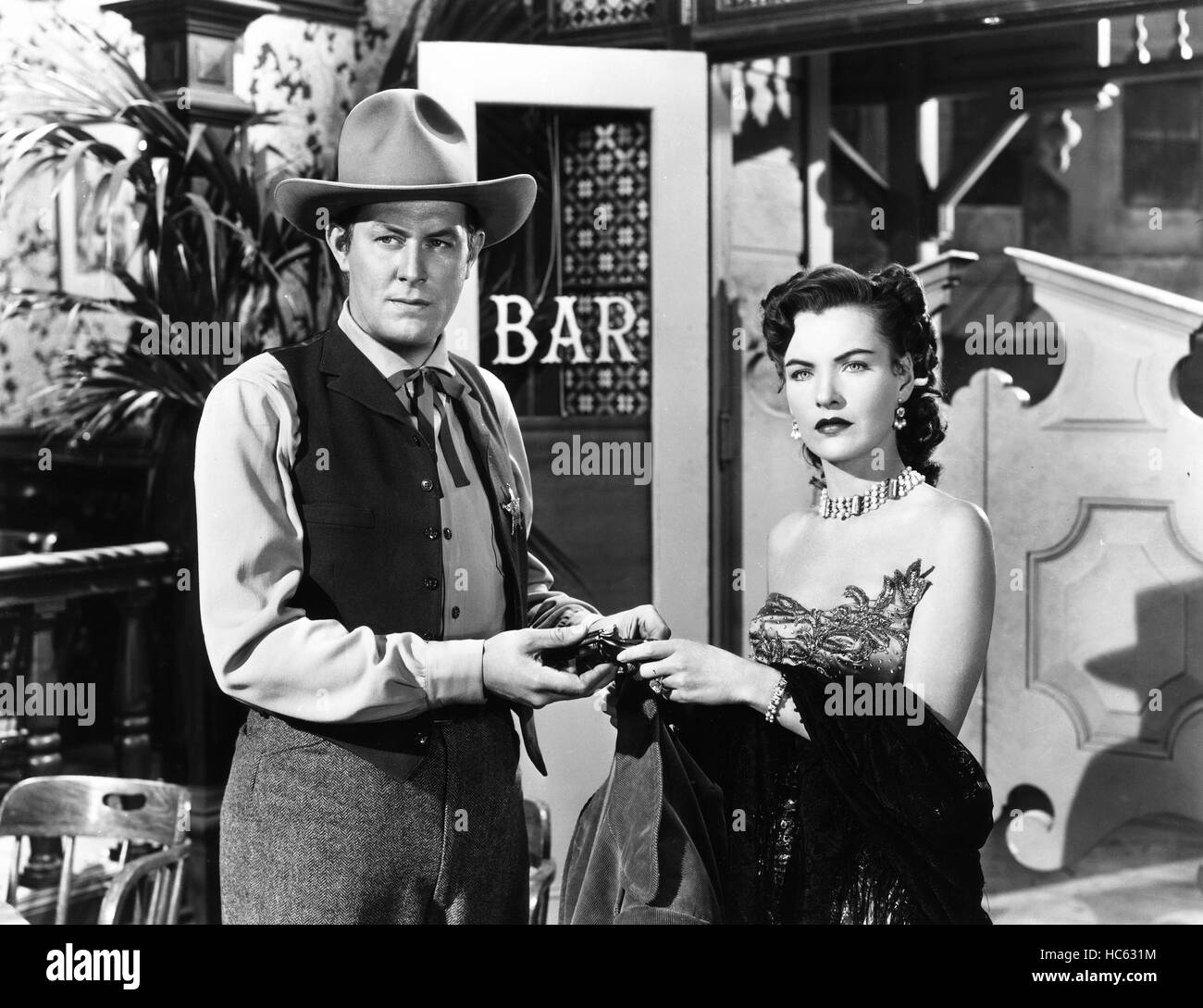 SINGING GUNS, from left: Vaughn Monroe, Ella Raines, 1950 Stock Photo ...