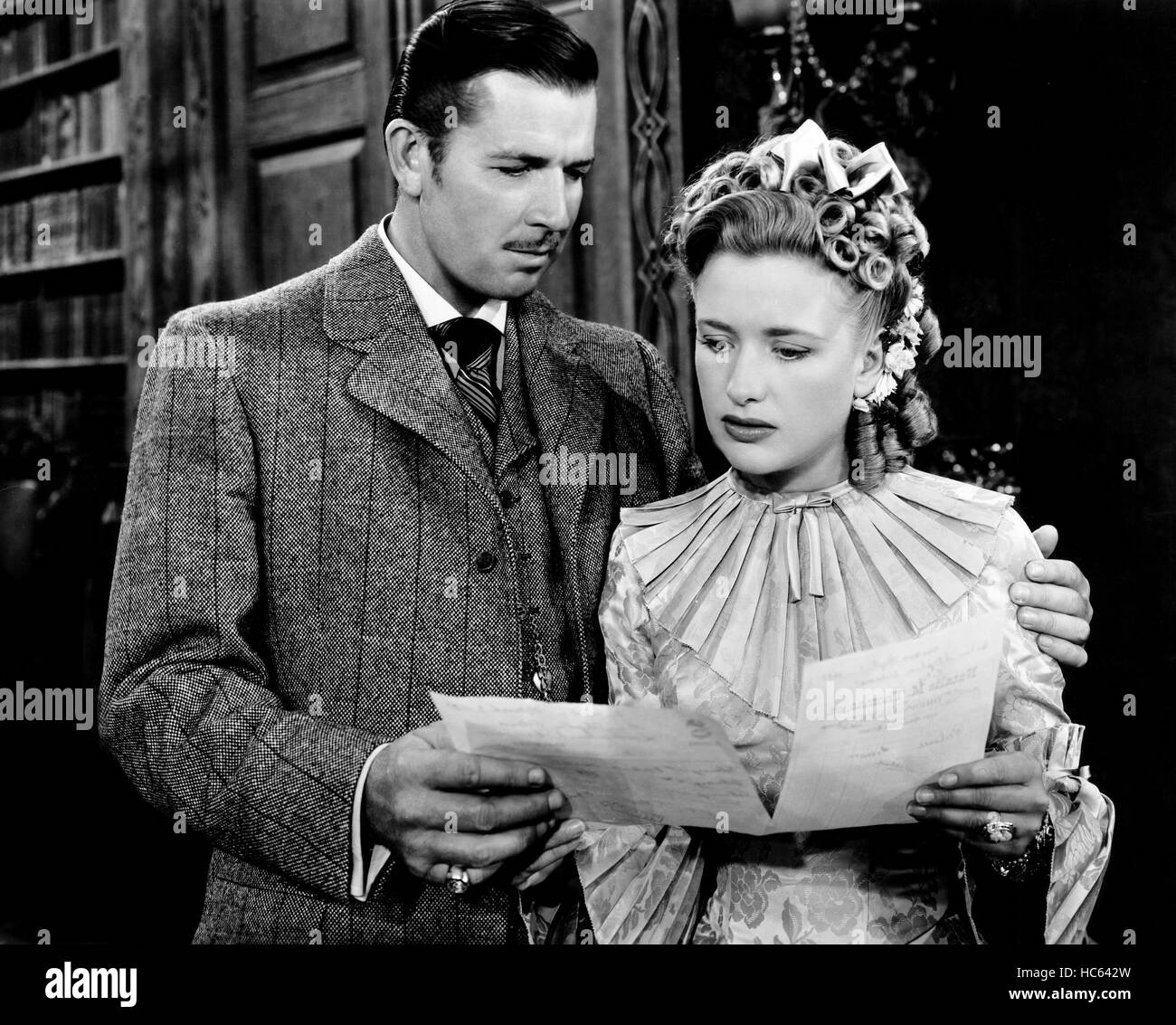 SILVER QUEEN, from left, Bruce Cabot, Priscilla Lane, 1942 Stock Photo ...