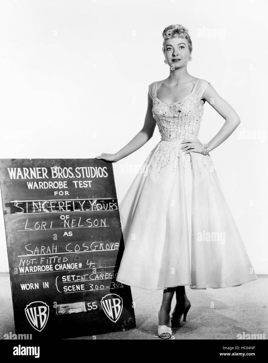 SINCERELY YOURS, Lori Nelson, in a yellow shantung organza gown with ...