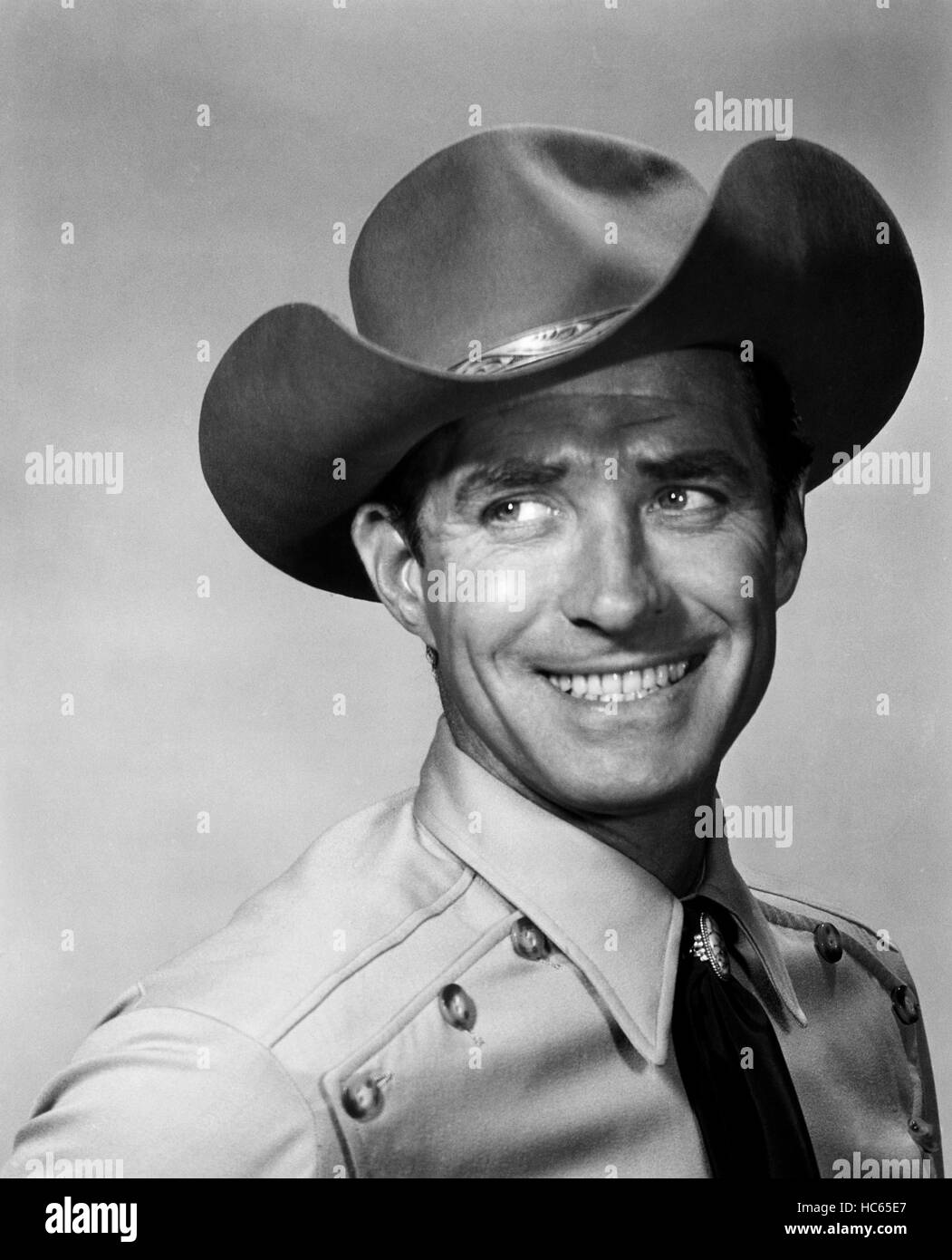 SLIM CARTER, Jock Mahoney, 1957 Stock Photo - Alamy