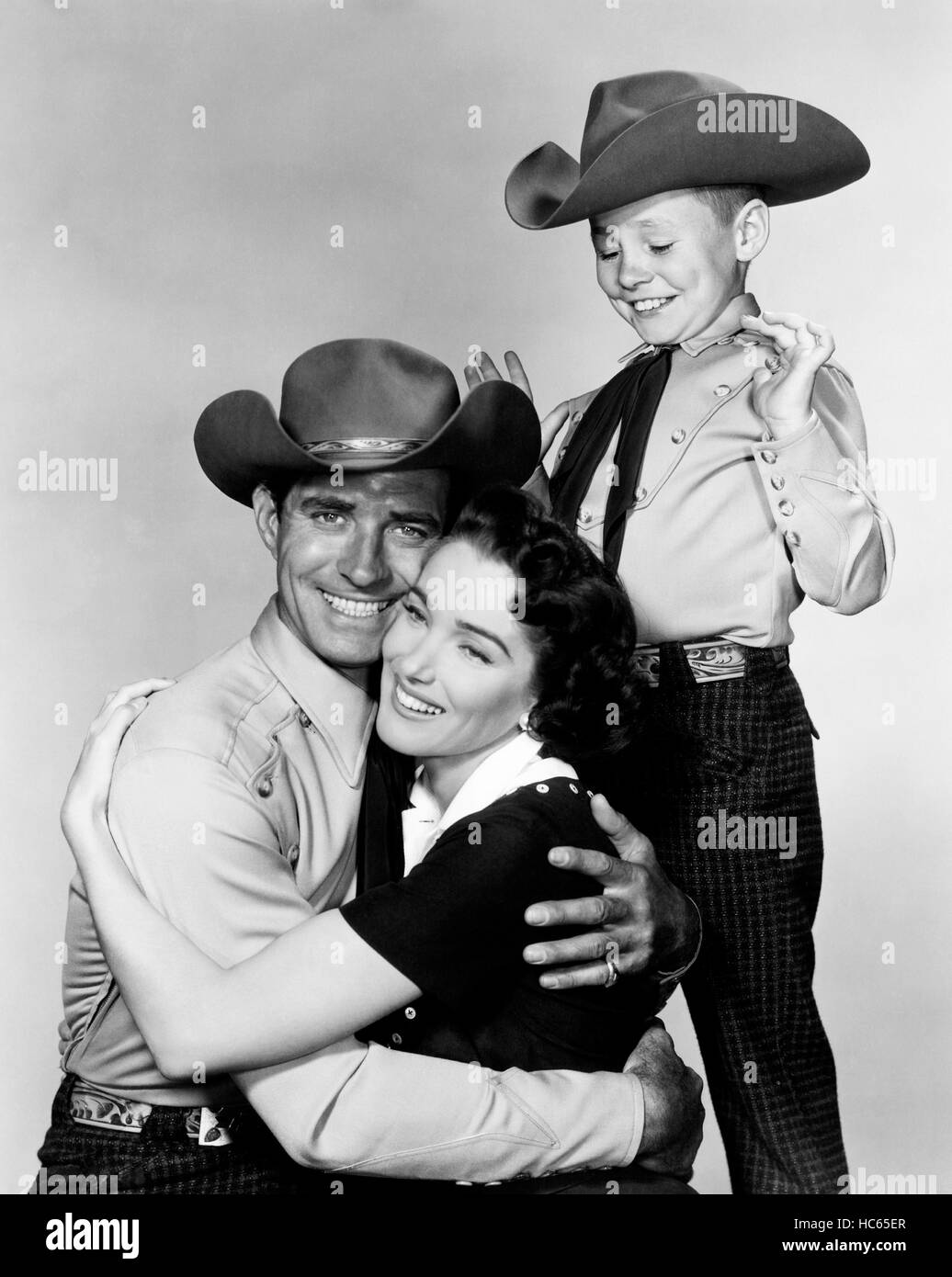 SLIM CARTER, front from left: Jock Mahoney, Julie Adams, Tim Hovey ...