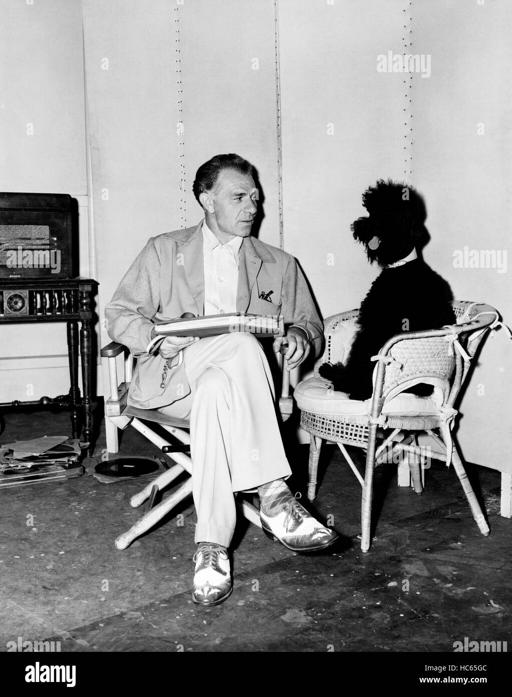 SLIGHTLY DANGEROUS, director Wesley Ruggles and his French poodle ...
