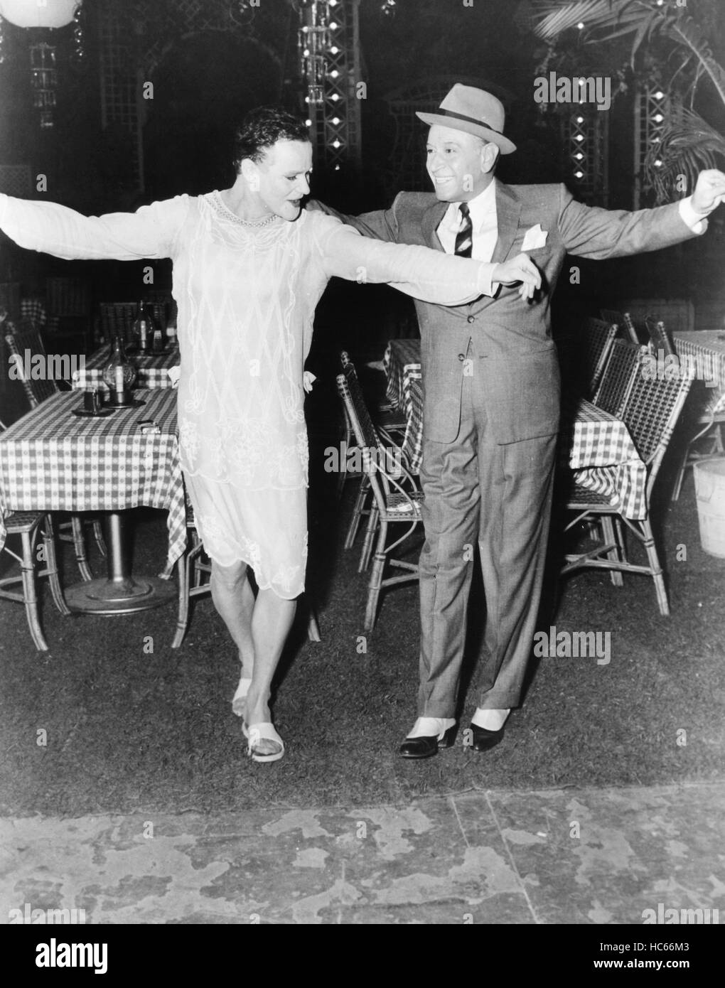 SOME LIKE IT HOT, from left: Jack Lemmon, George Raft dancing on set ...