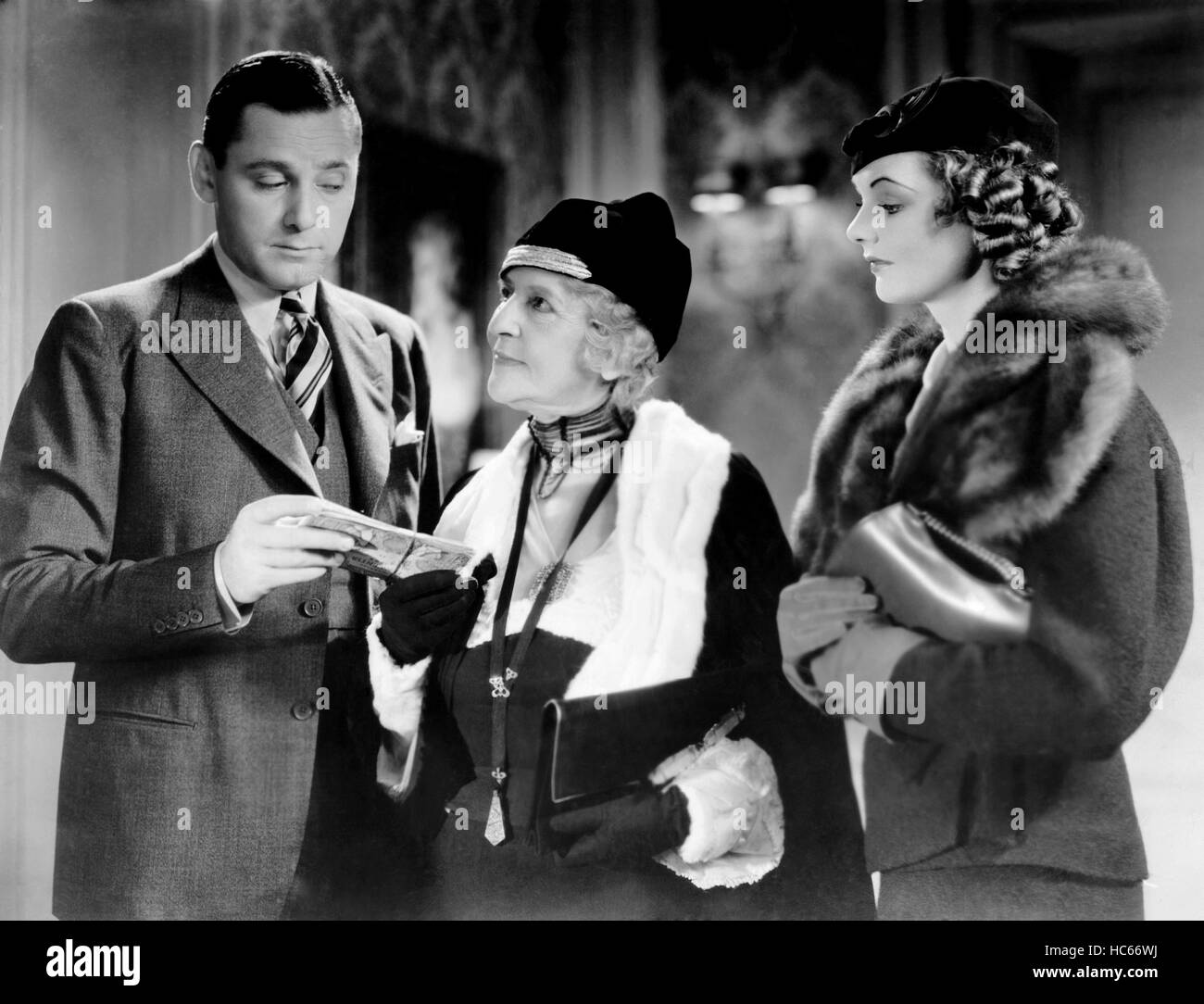 THE SOLITAIRE MAN, from left, Herbert Marshall, May Robson, Elizabeth ...