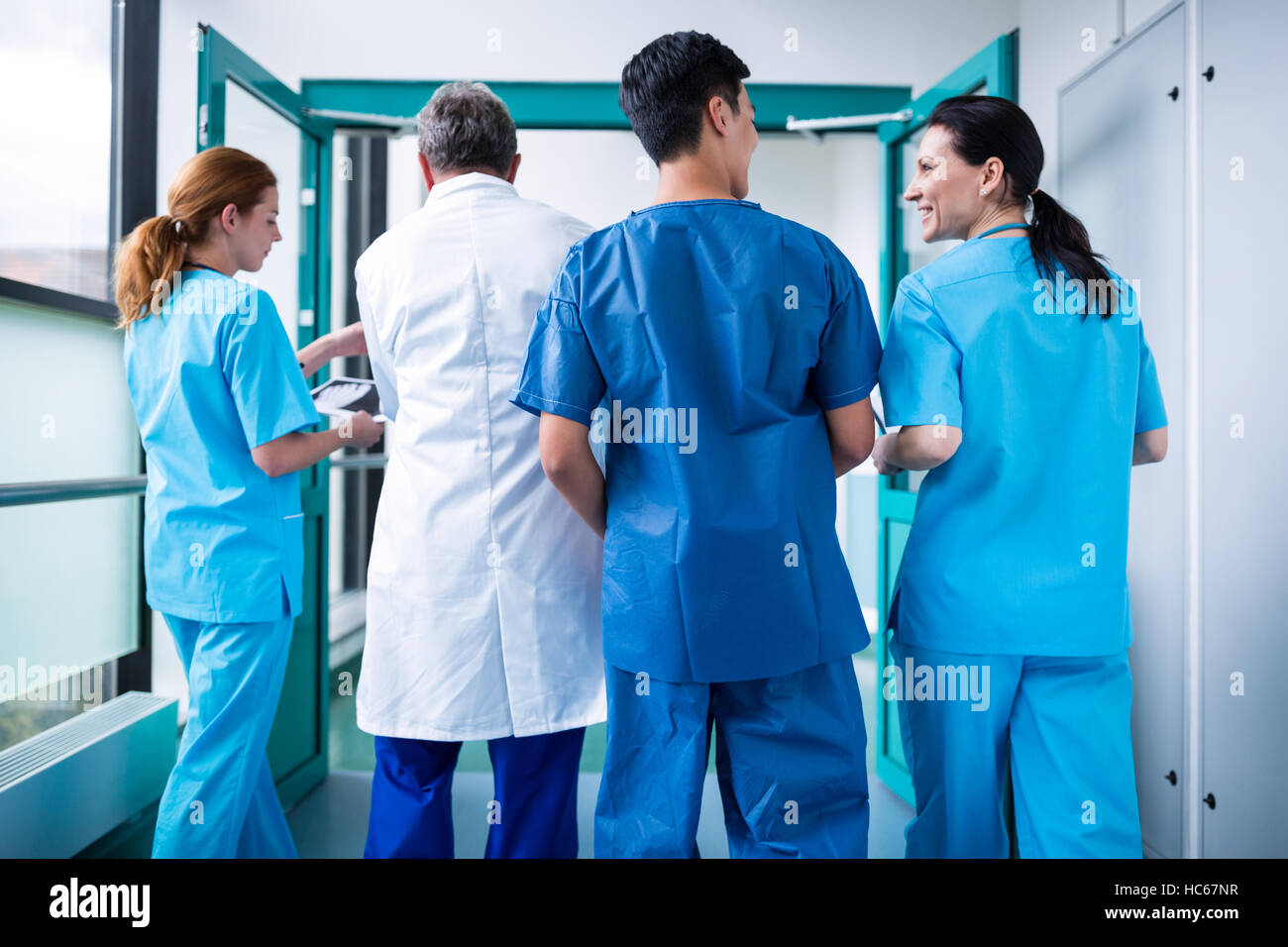 Rear view young man doctor hi-res stock photography and images - Alamy
