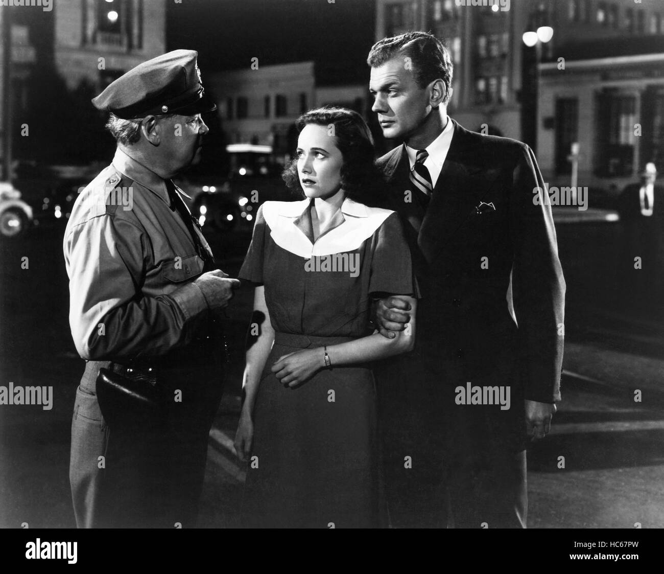 SHADOW OF A DOUBT, from left, Earle S. Dewey, Teresa Wright, Joseph ...