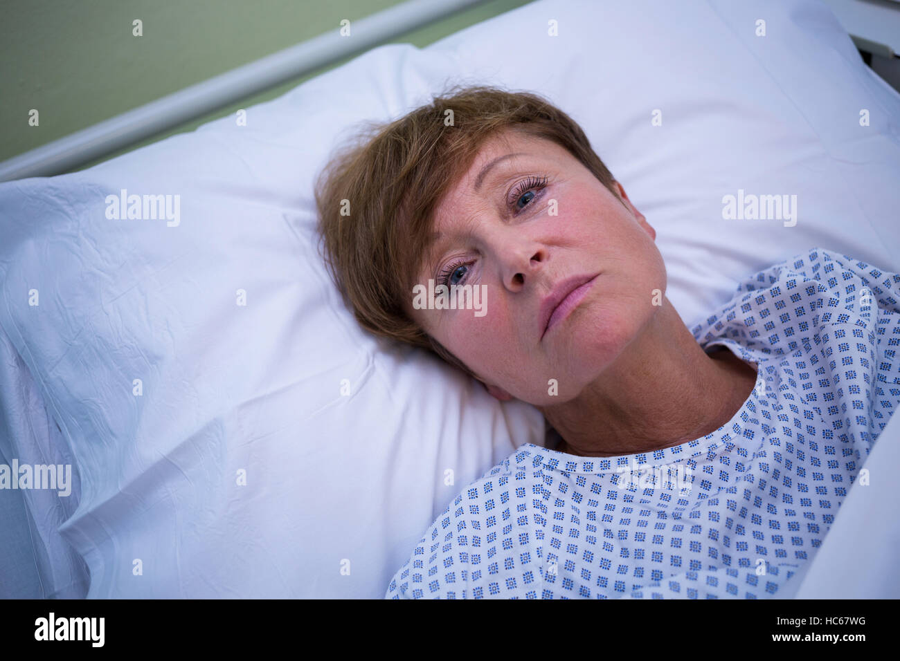 Hospital bed and patient and sad hi-res stock photography and images ...