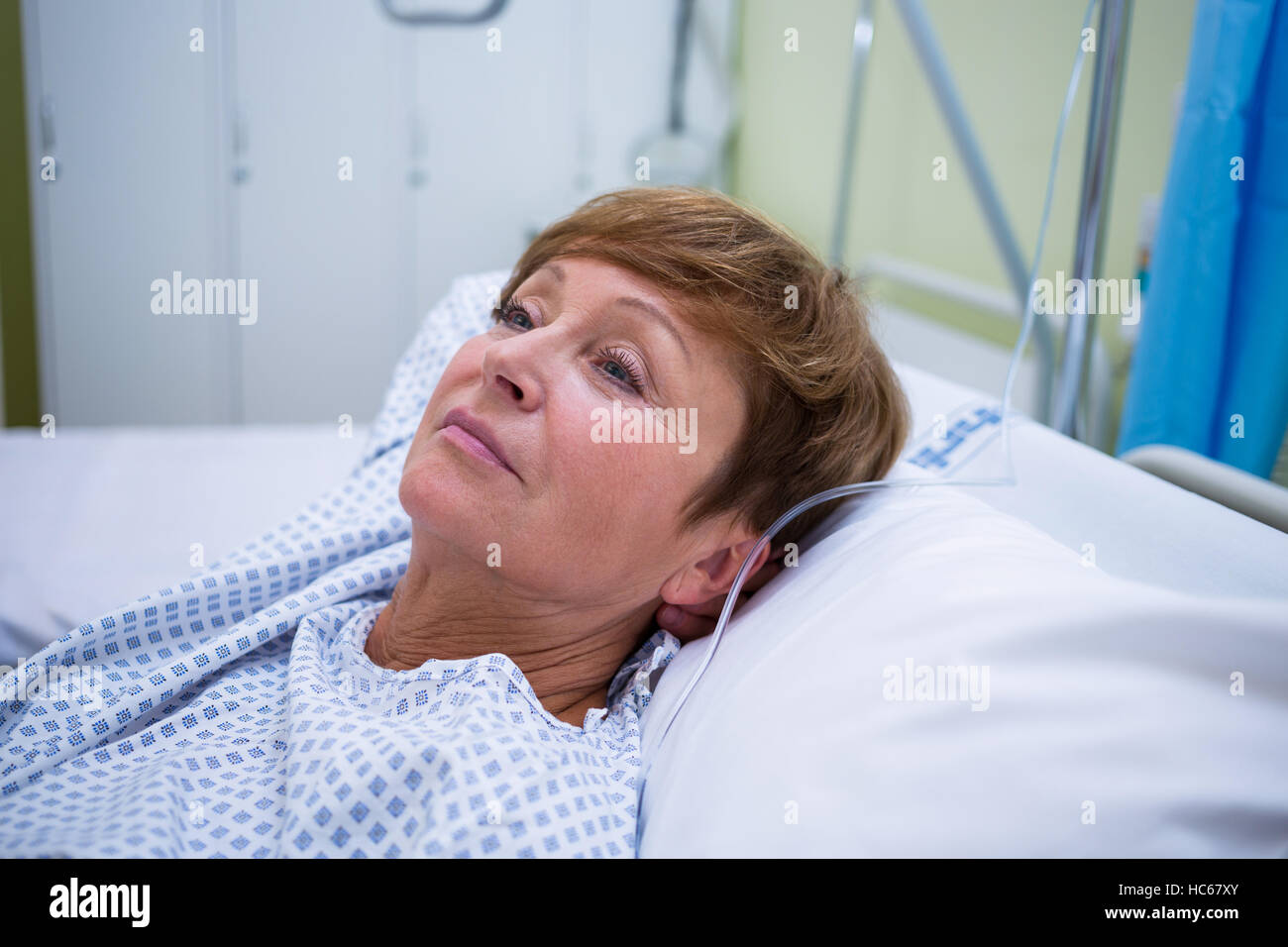 Hospital bed and patient and sad hi-res stock photography and images ...