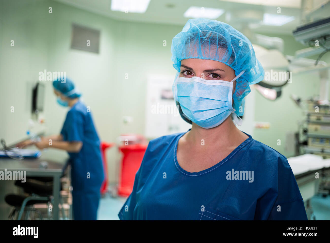 Portrait of a female surgeon standing in operation room Stock Photo - Alamy