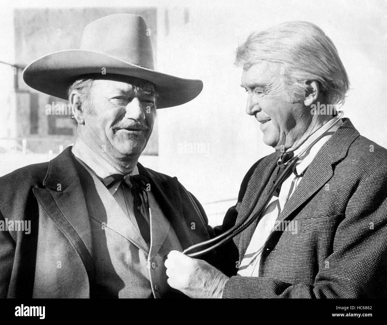 THE SHOOTIST, John Wayne, James Stewart, 1976 Stock Photo - Alamy