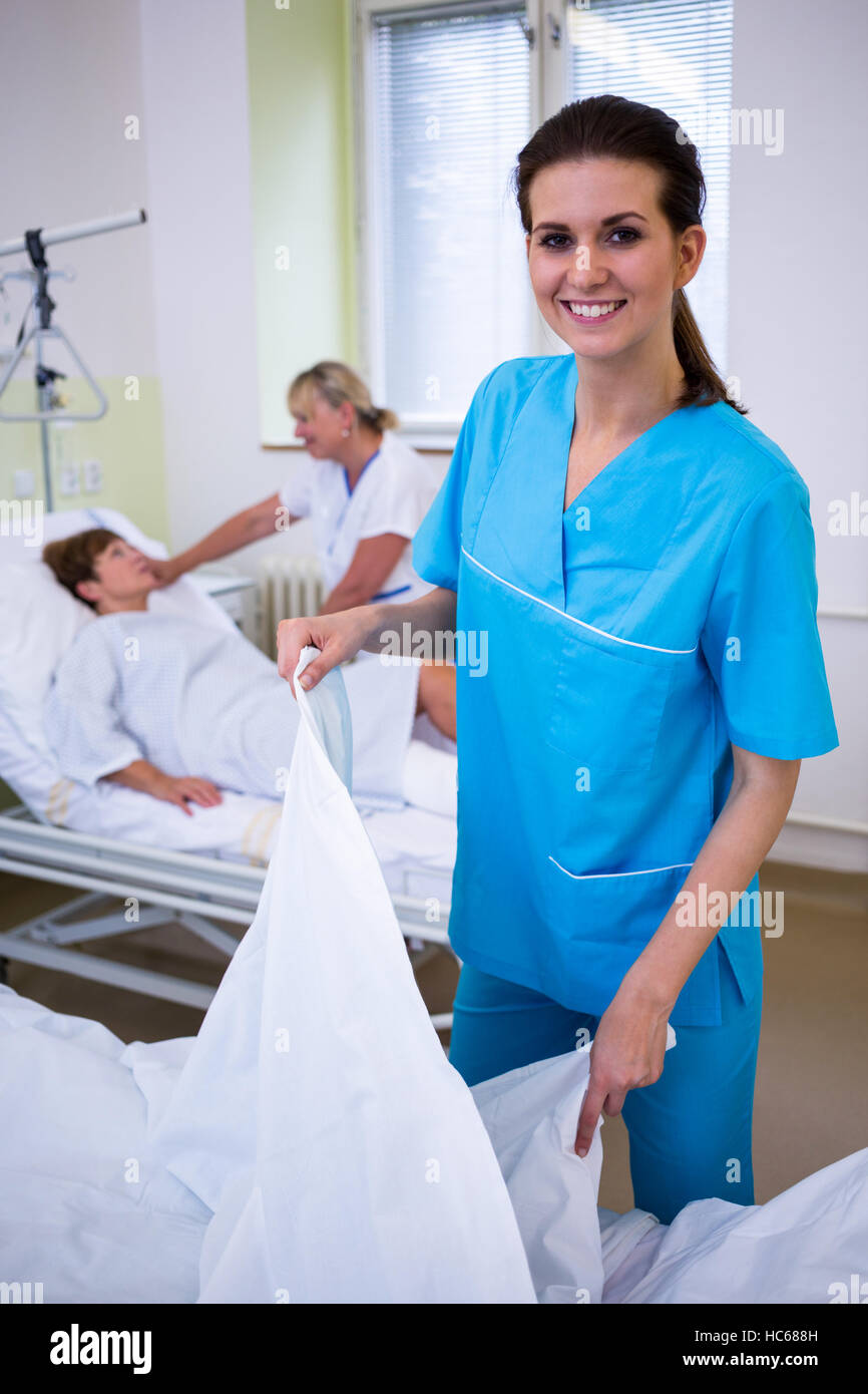 Smiling nurse preparing medical hi-res stock photography and images - Alamy
