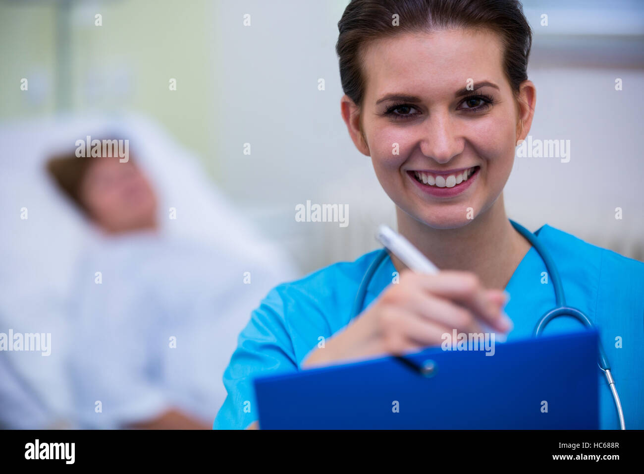 Nurse holding a medical report Stock Photo - Alamy