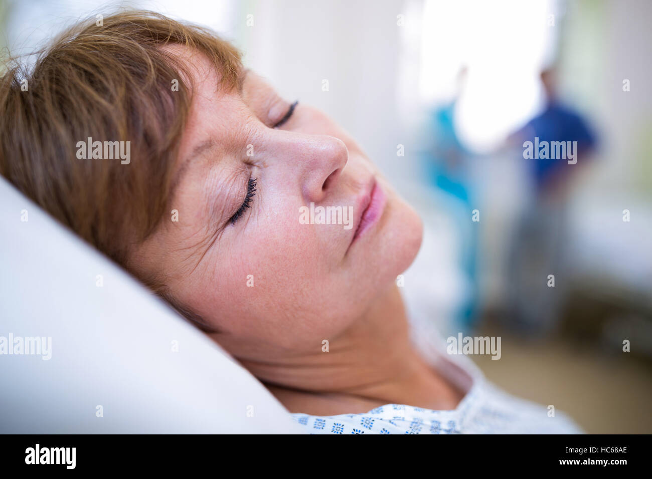 Patient sleeping on bed Stock Photo - Alamy