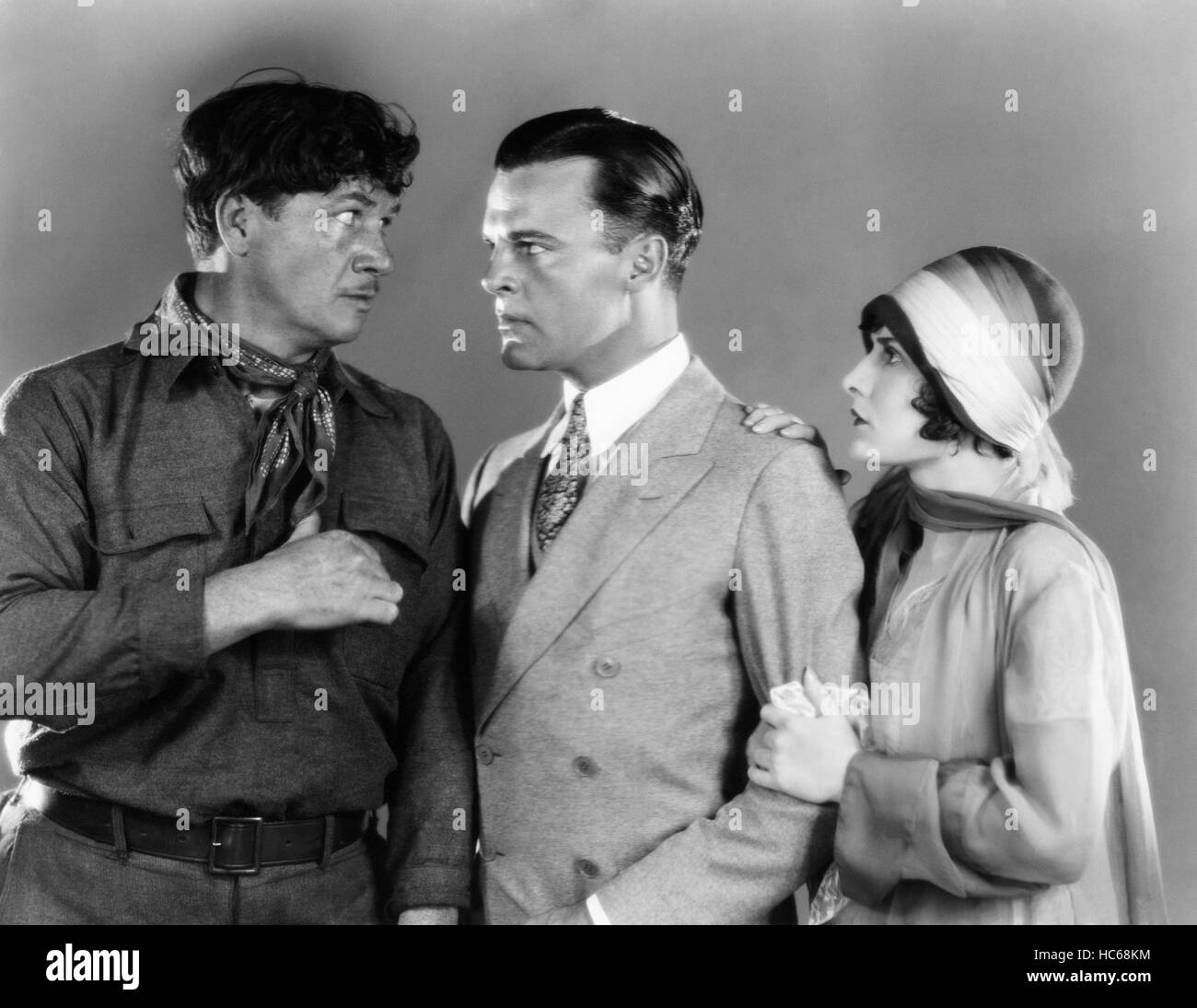 THE SHOWDOWN, from left, George Bancroft, Neil Hamilton, Evelyn Brent ...