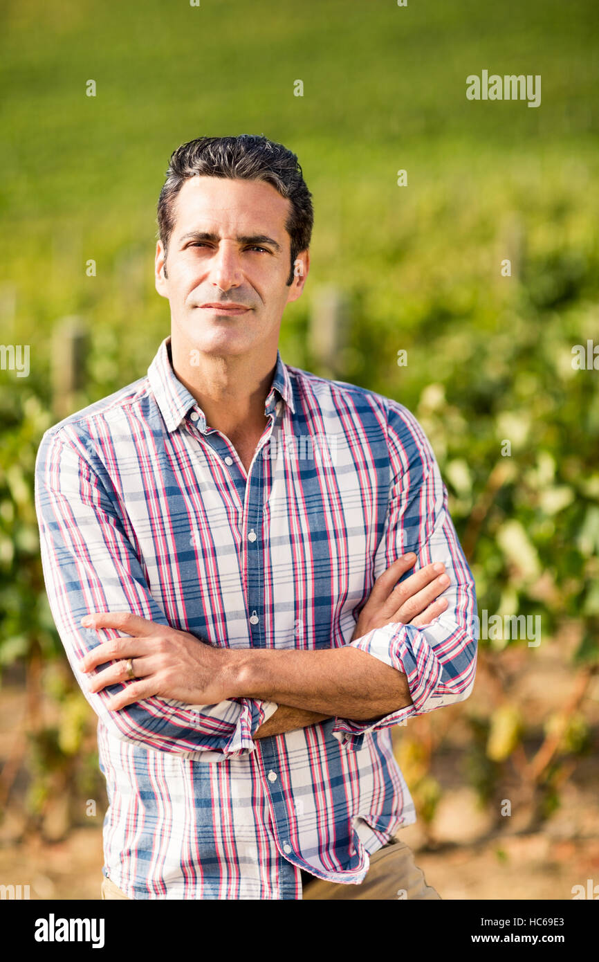 Portrait of male vintner standing with arms crossed Stock Photo - Alamy