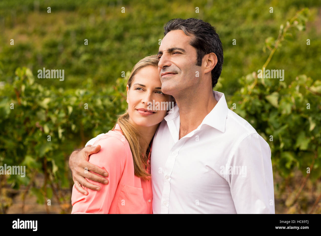Happy couple embracing each other Stock Photo - Alamy