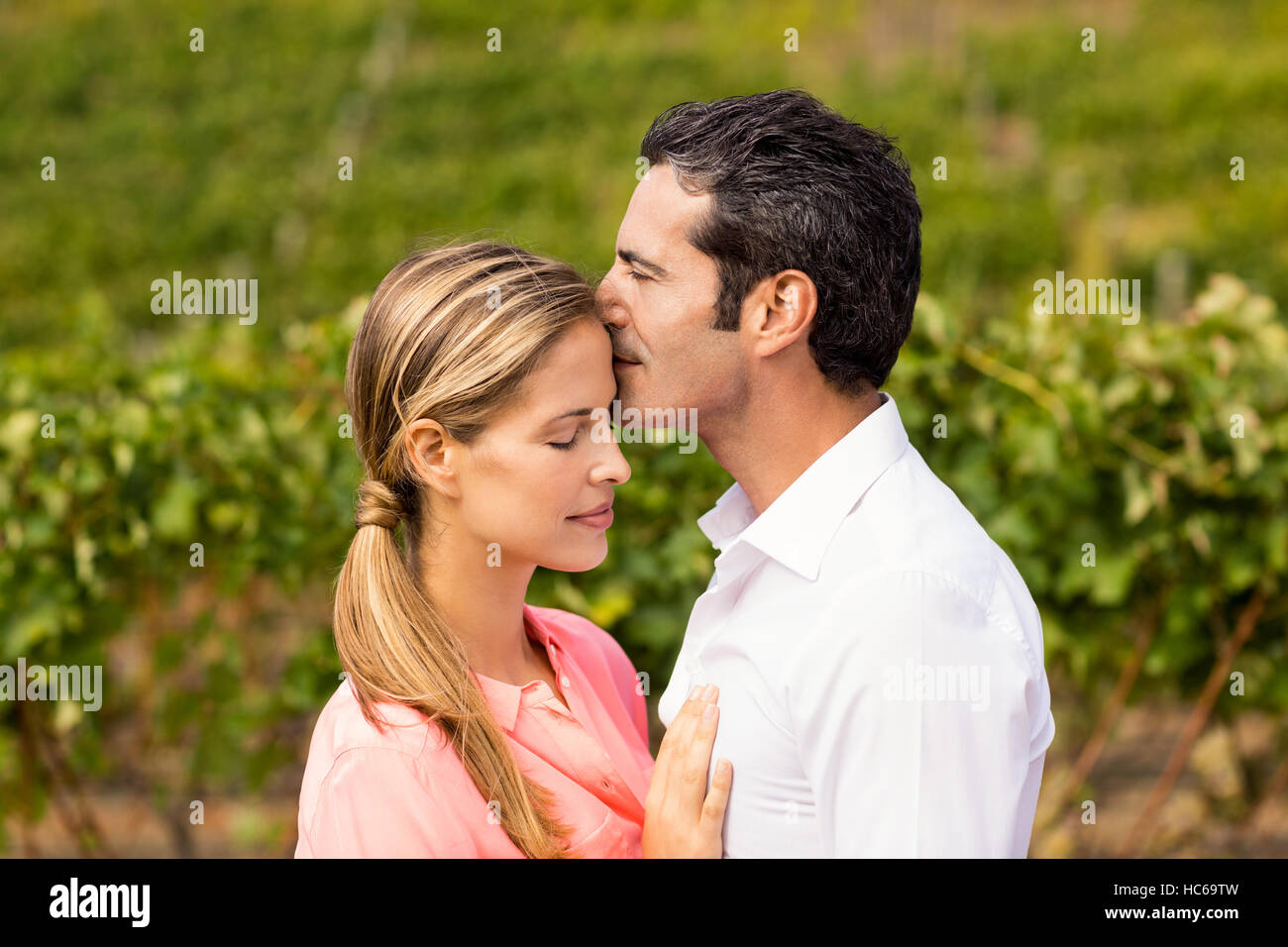 Happy couple embracing each other Stock Photo - Alamy