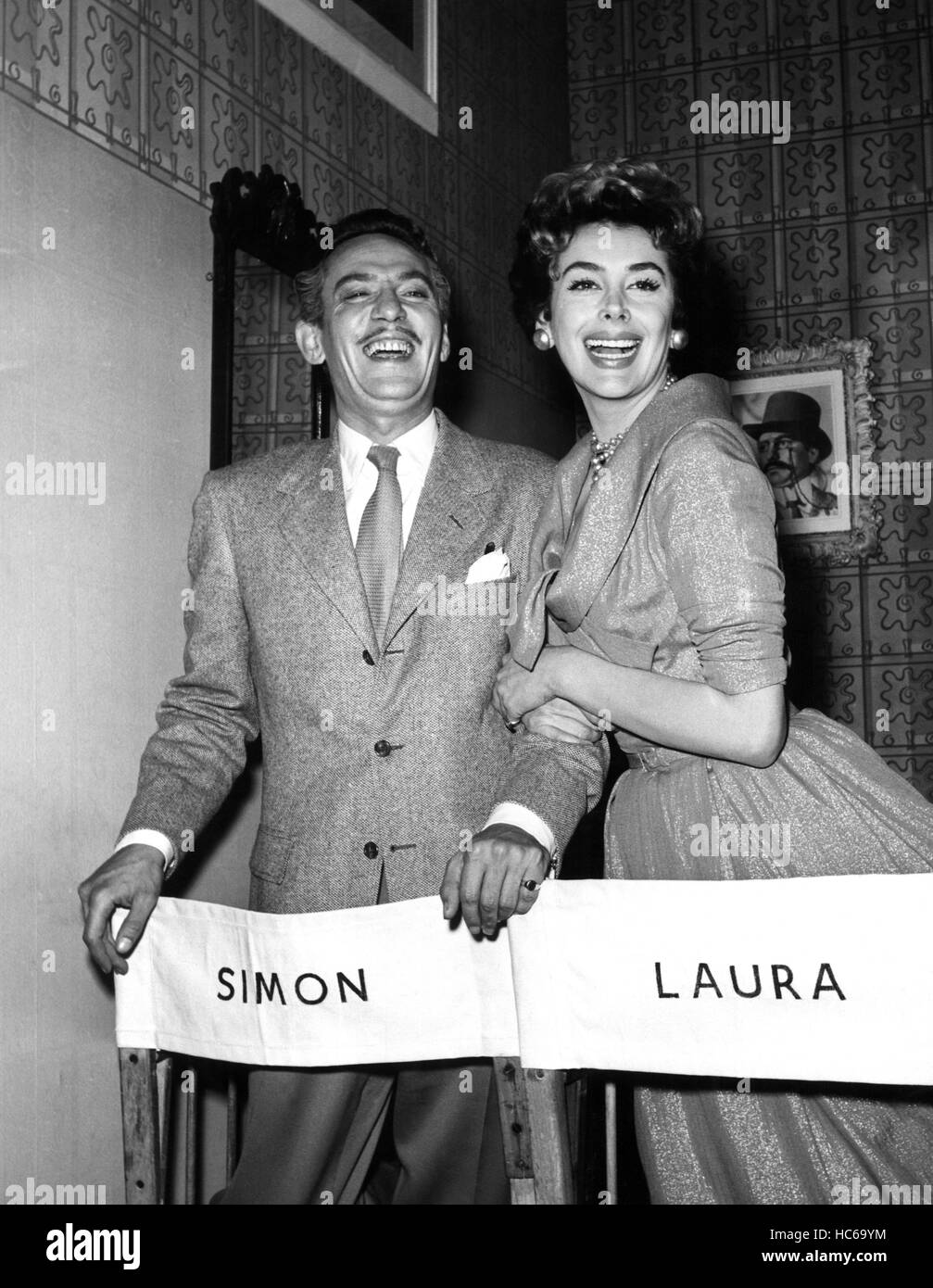 SIMON AND LAURA, Peter Finch and Kay Kendall enjoying a break on set ...