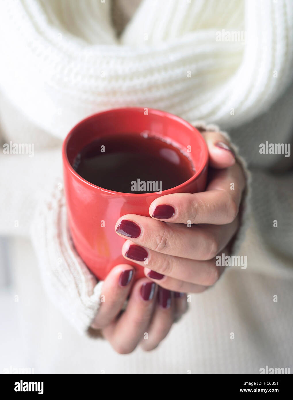 Female hands with cup Stock Photo - Alamy
