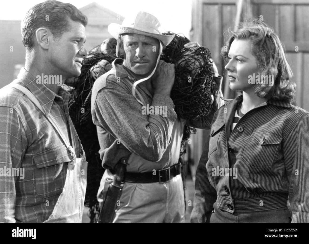 SPOILERS OF THE NORTH, from left: Paul Kelly, Roy Barcroft, right ...