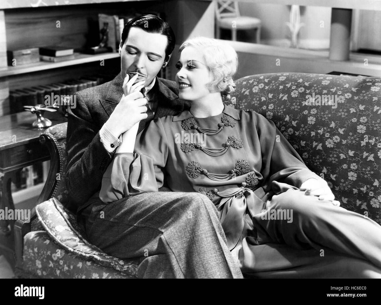 STRANGE WIVES, from left, Roger Pryor, Esther Ralston, 1934 Stock Photo ...