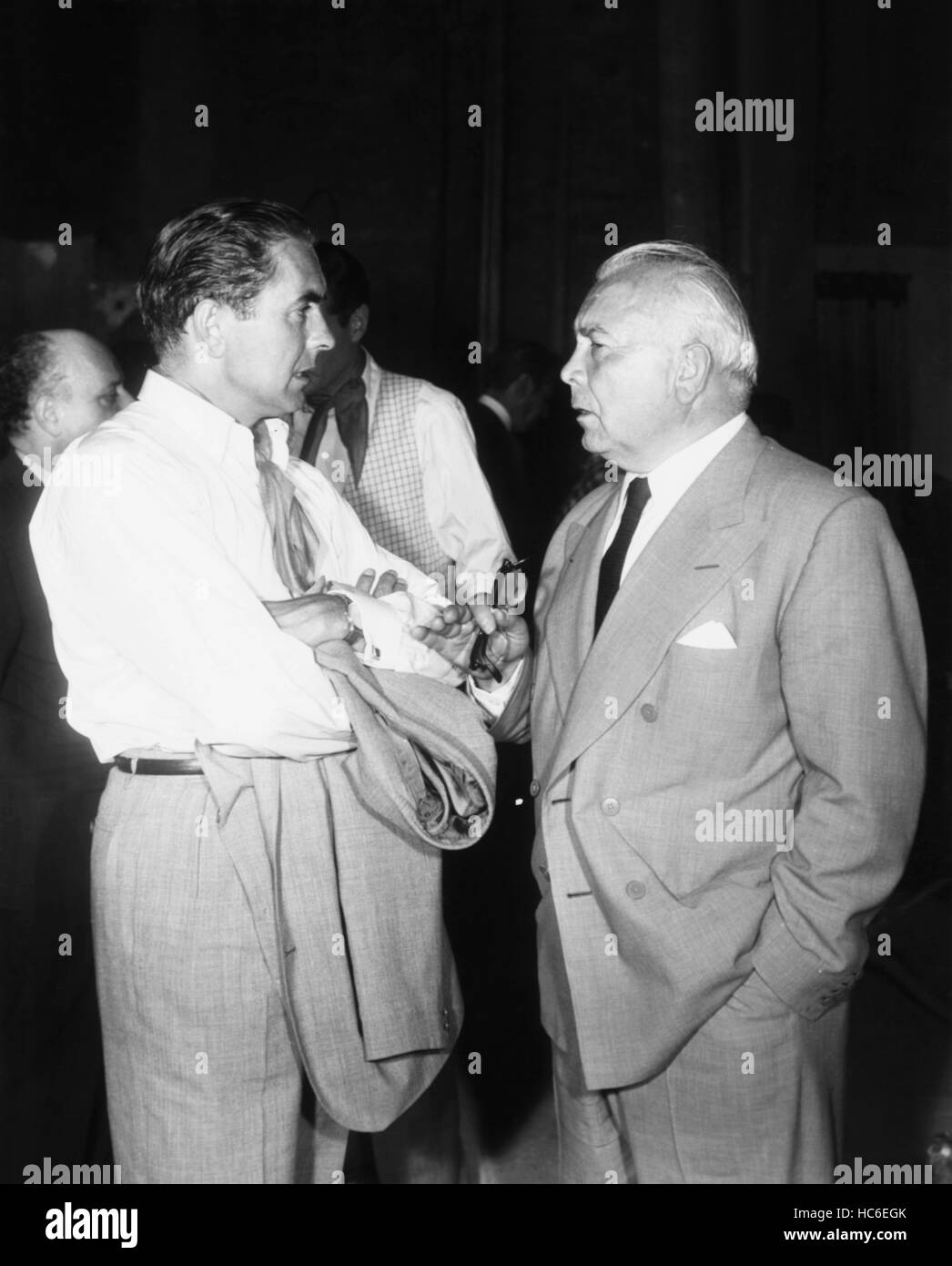 THE SUN ALSO RISES, from left: Tyrone Power, Spyros Skouras on set ...
