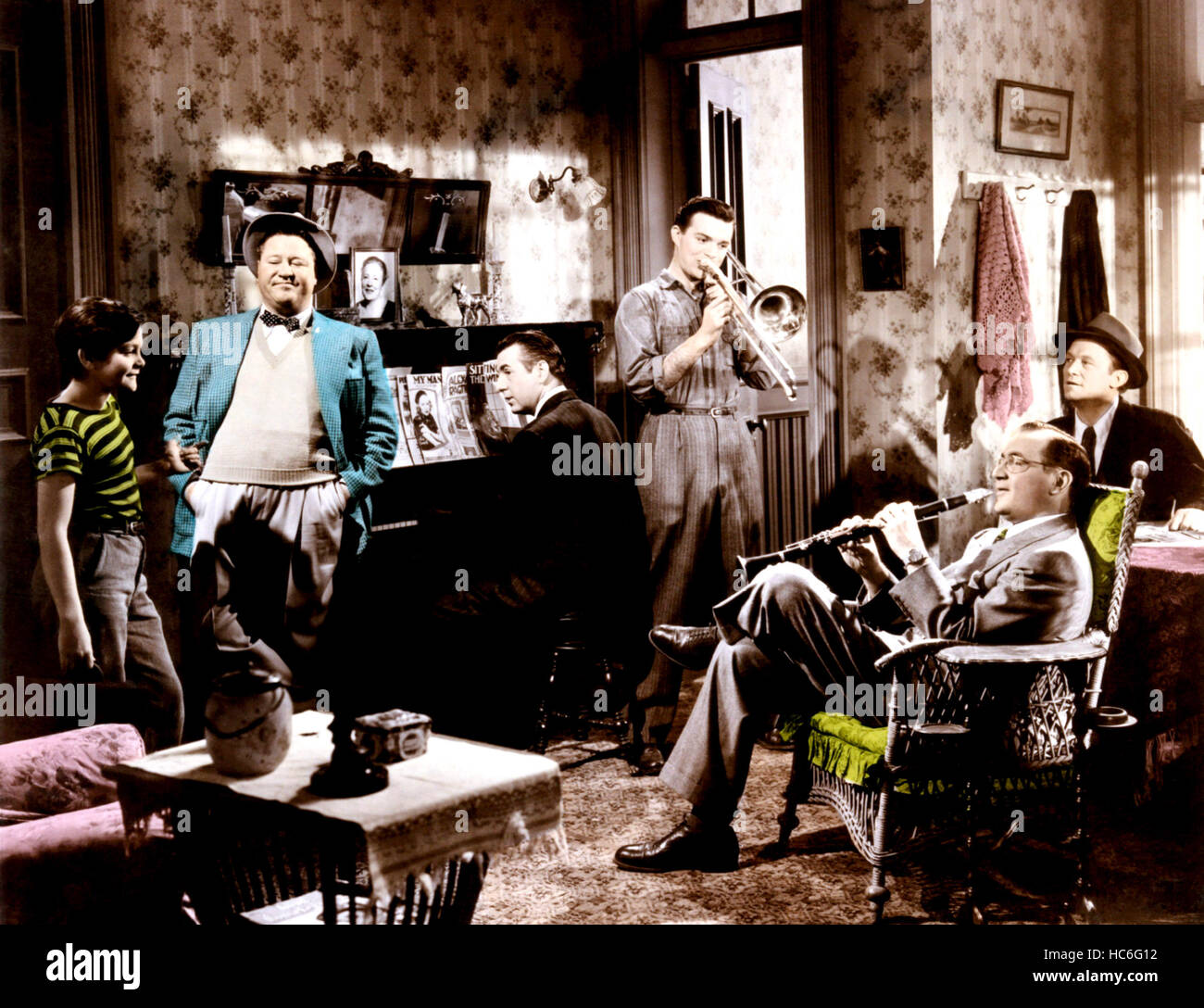 SWEET AND LOW-DOWN, Buddy Swan (left), Jack Oakie (hands in pockets ...