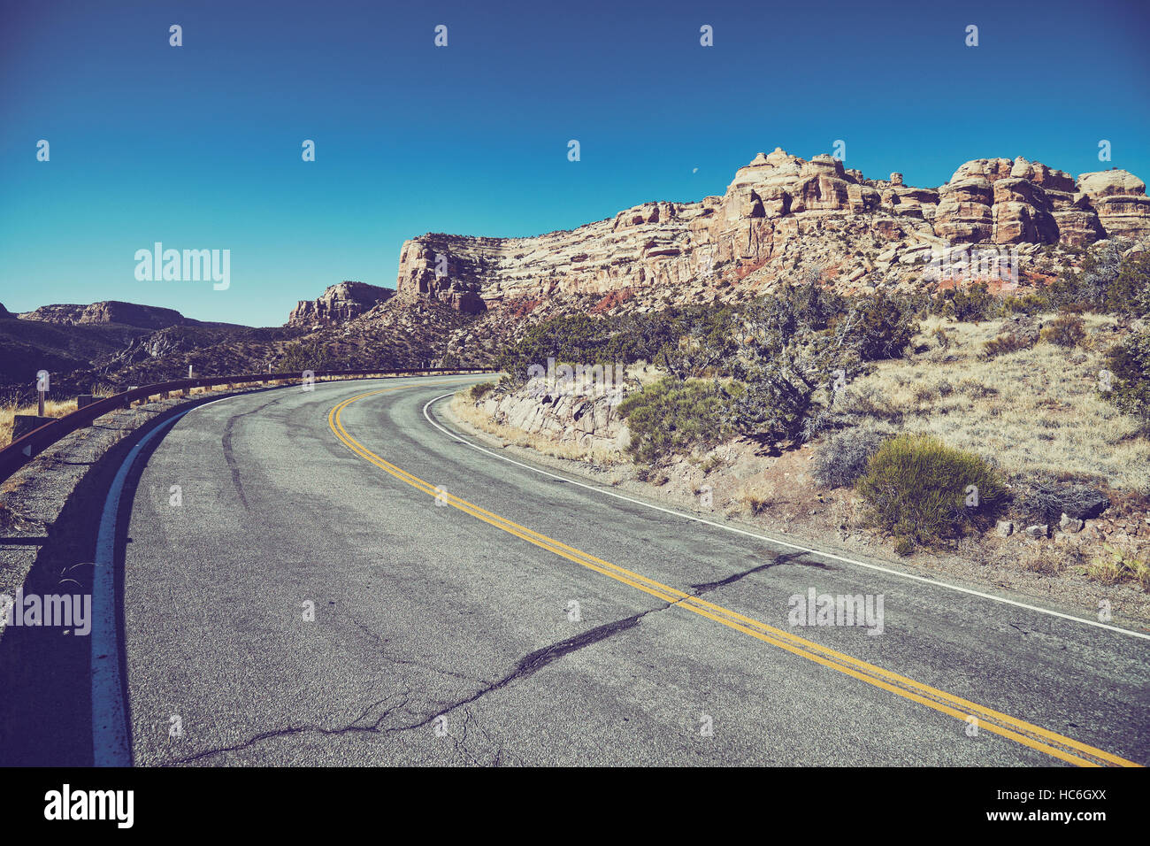 Vintage stylized road, travel concept background, Colorado National ...