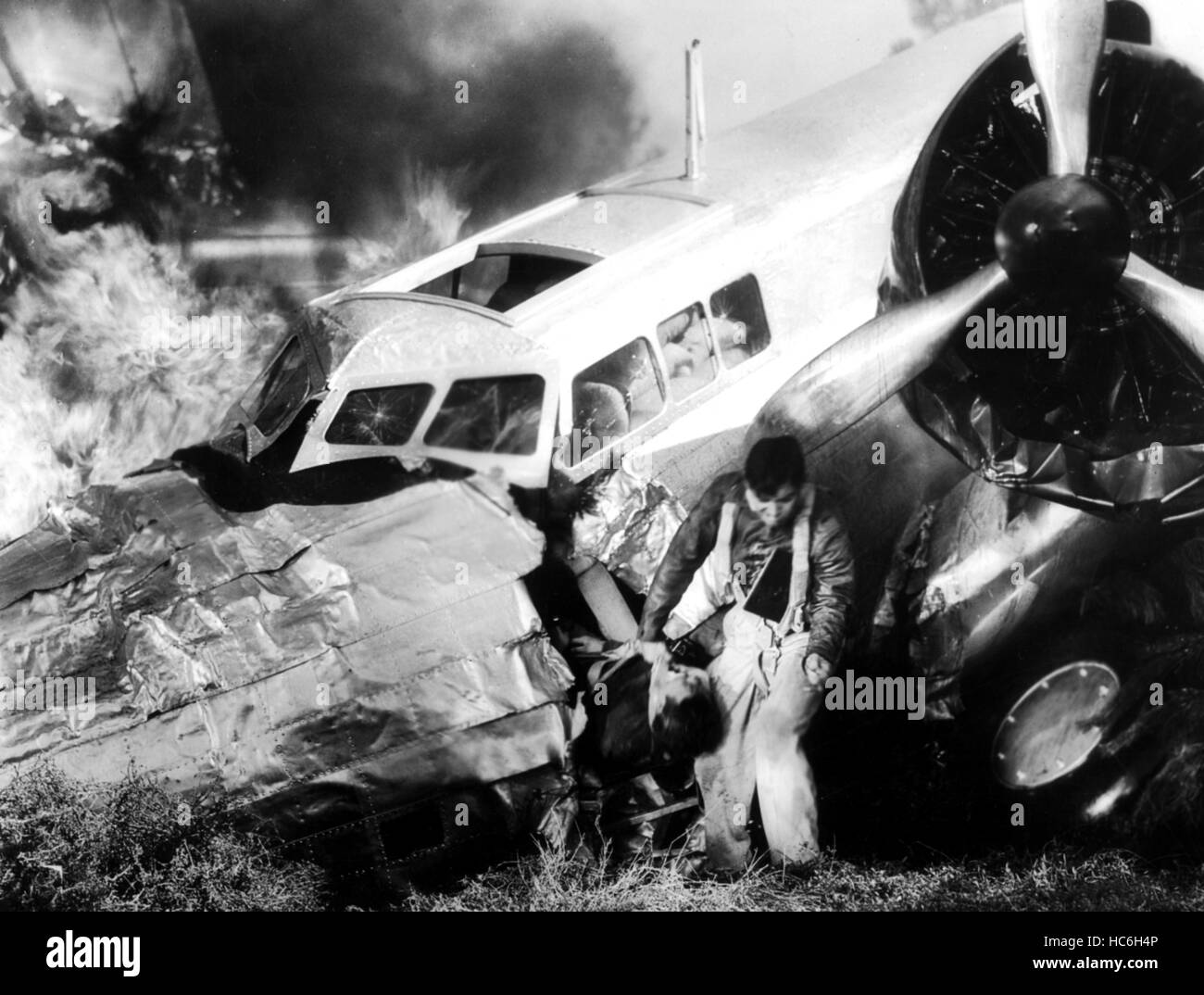 TEST PILOT, Clark Gable pulling out Spencer Tracy, 1938 Stock Photo - Alamy