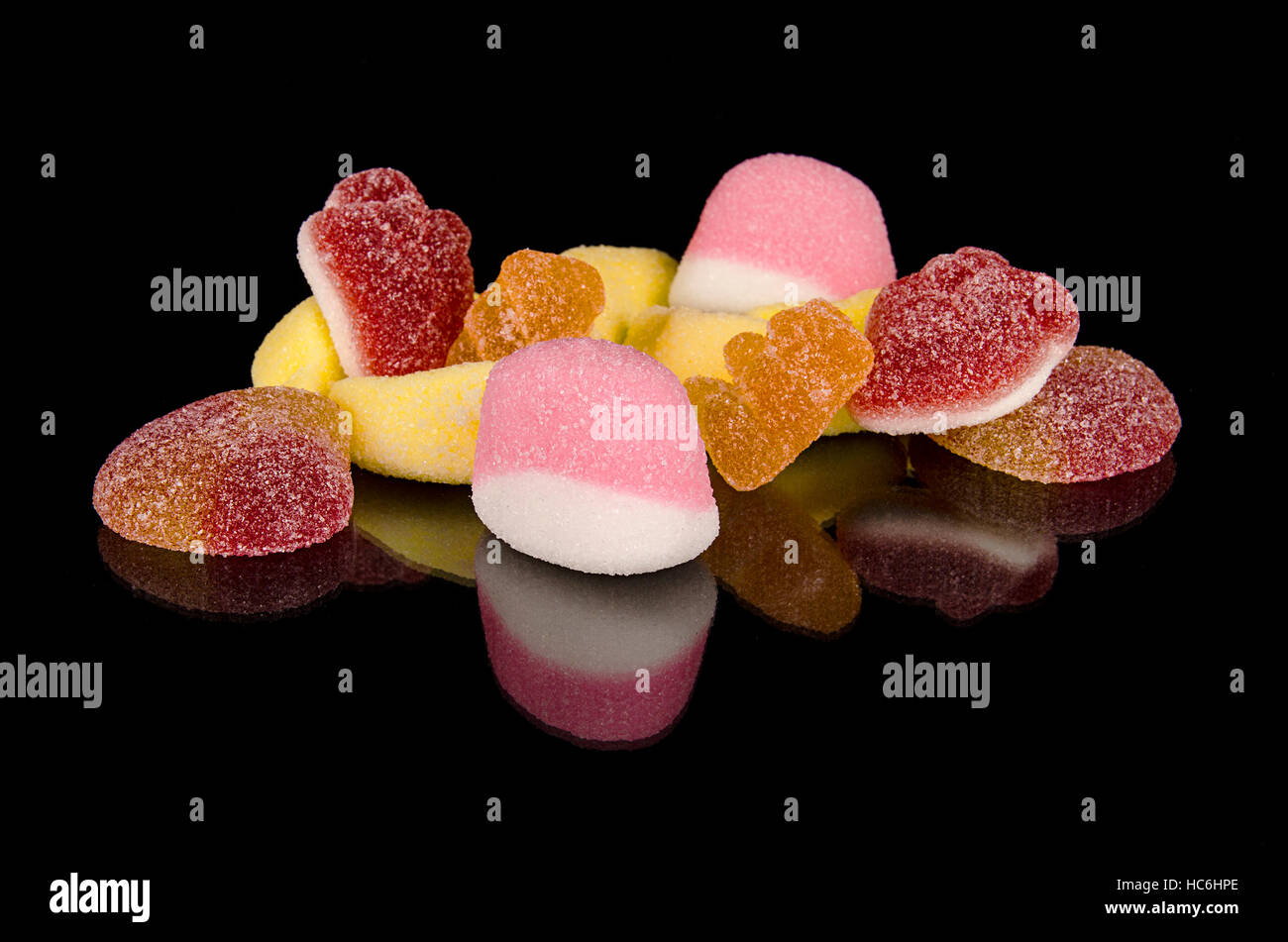 Colorful Candy assortment over black isolated background Stock Photo ...