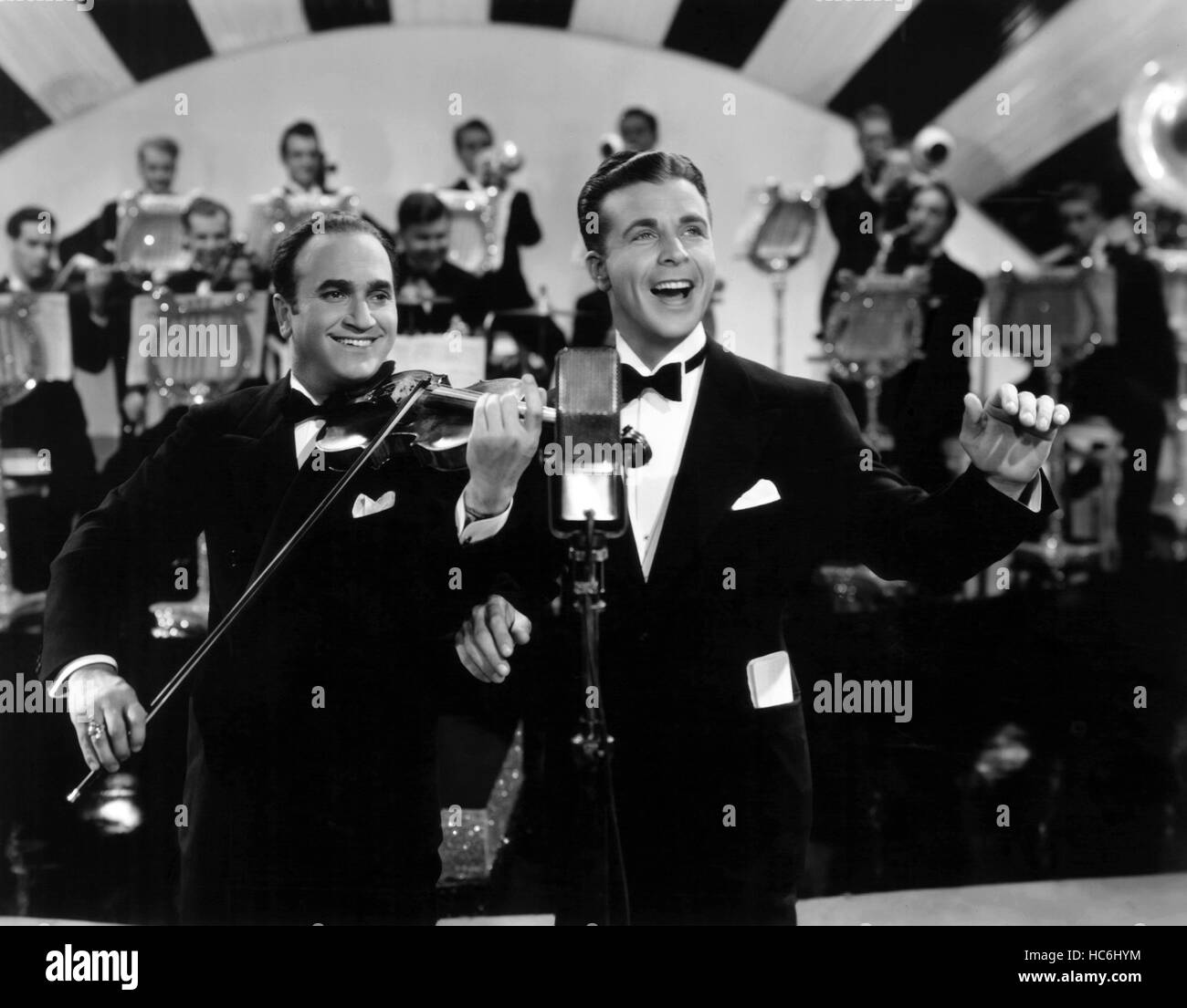 THANKS A MILLION, from left: David Rubinoff, Dick Powell, 1935, TM ...