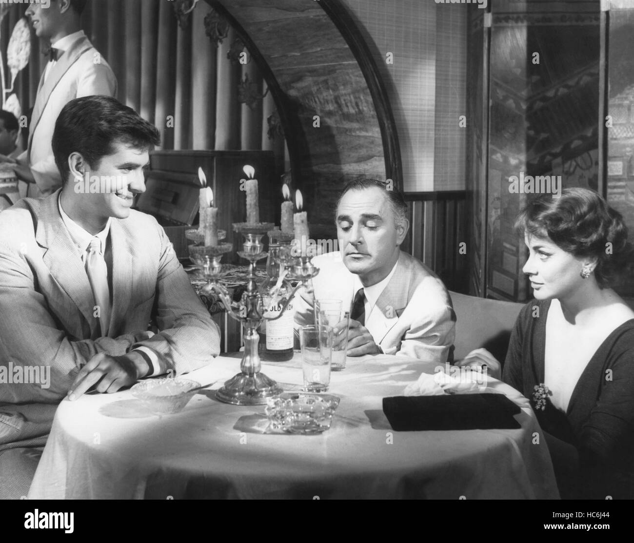 THIS ANGRY AGE, from left: Anthony Perkins, Guido Celano, Alida Valli ...
