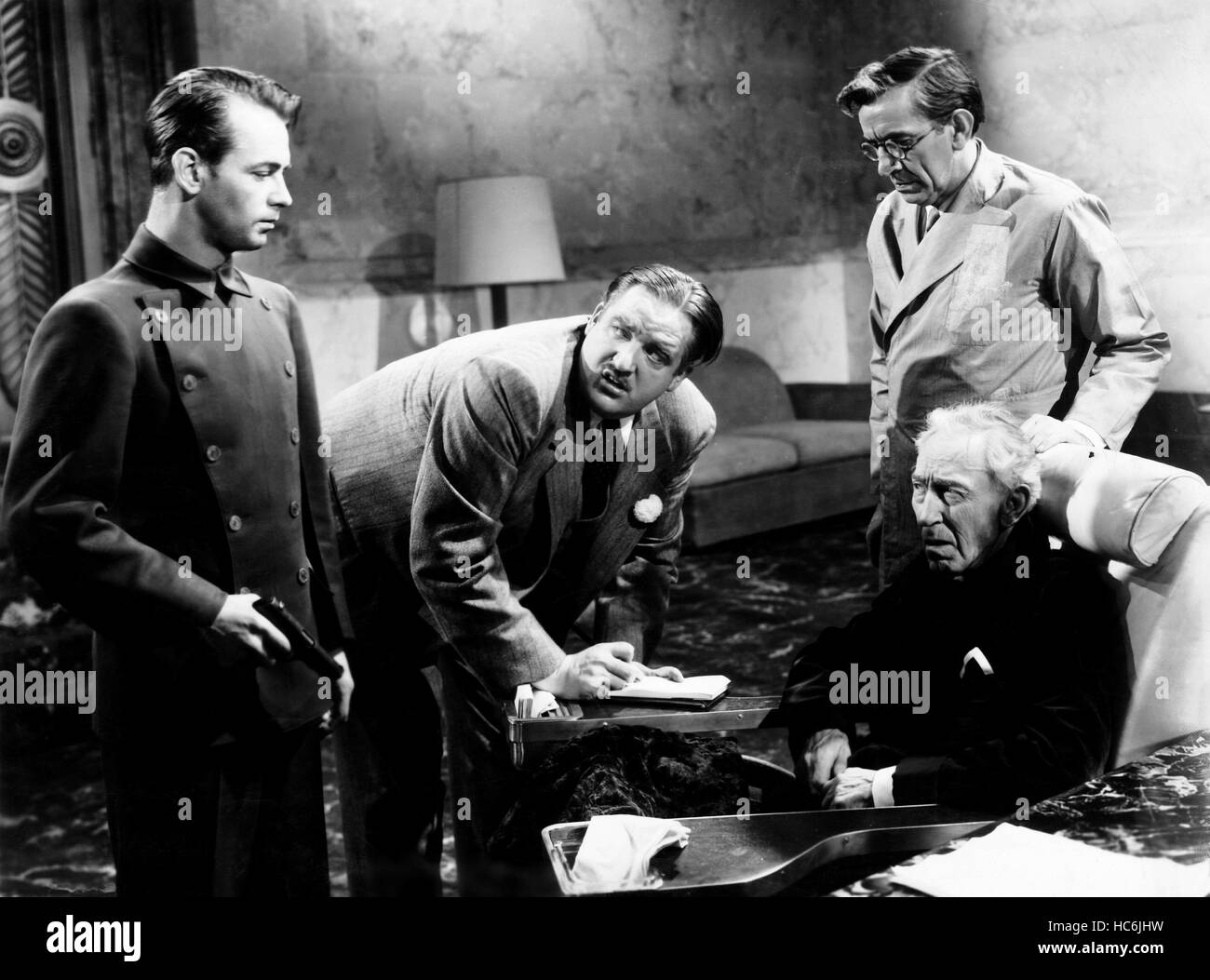 THIS GUN FOR HIRE, from left: Alan Ladd, Laird Cregar, Victor Kilian ...