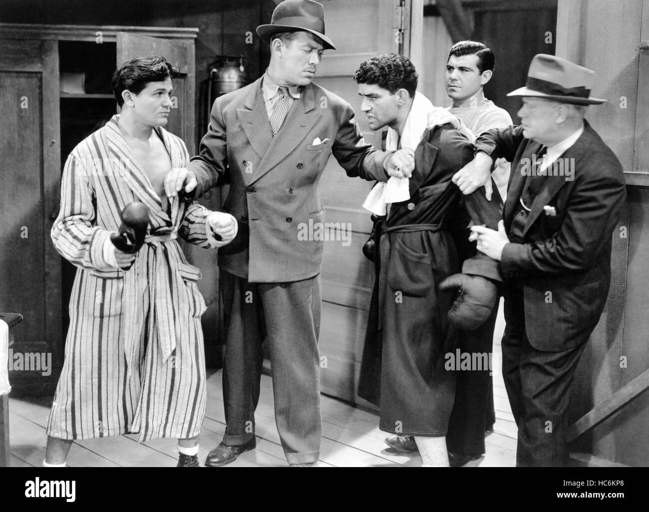 THEY MADE ME A CRIMINAL, front from left: John Garfield, Ward Bond ...