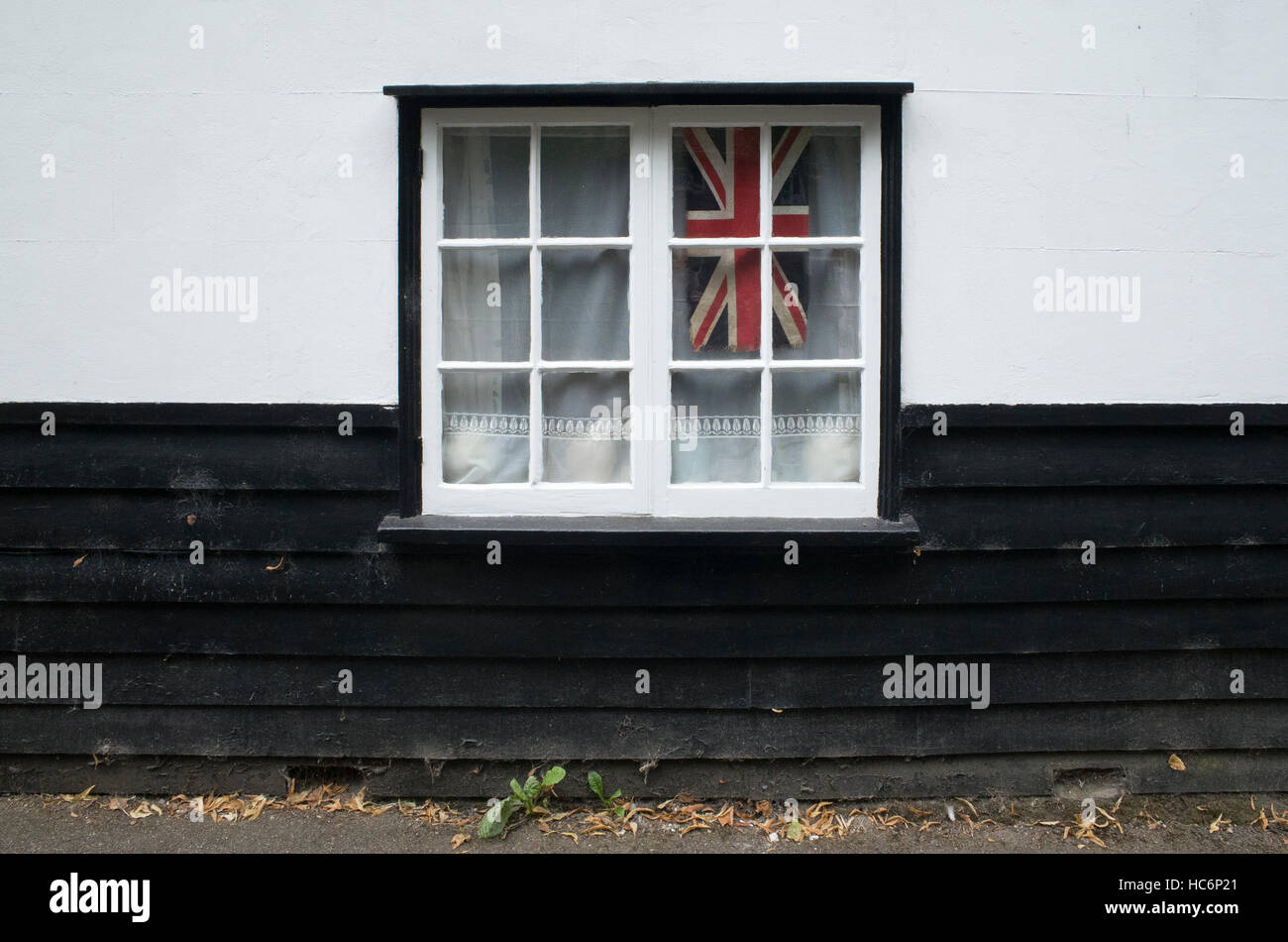 Union Jack on display in an old cottage in an English country town ...