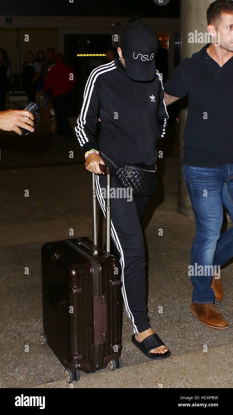 Orlando Bloom and Katy Perry arrive at Los Angeles International ...