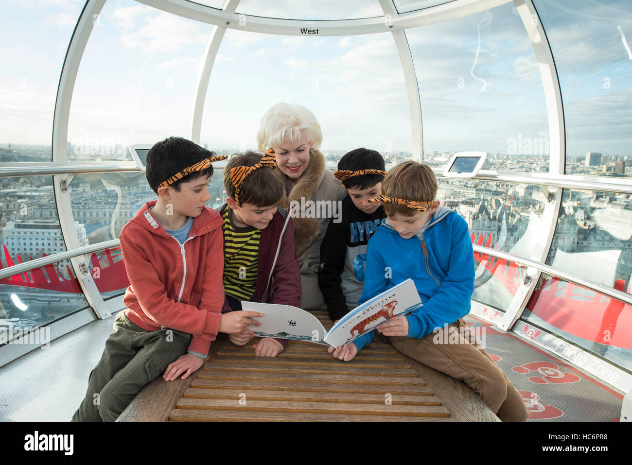 Jeanne Willis (centre, Author), competition winner Peter Salt (stripey ...