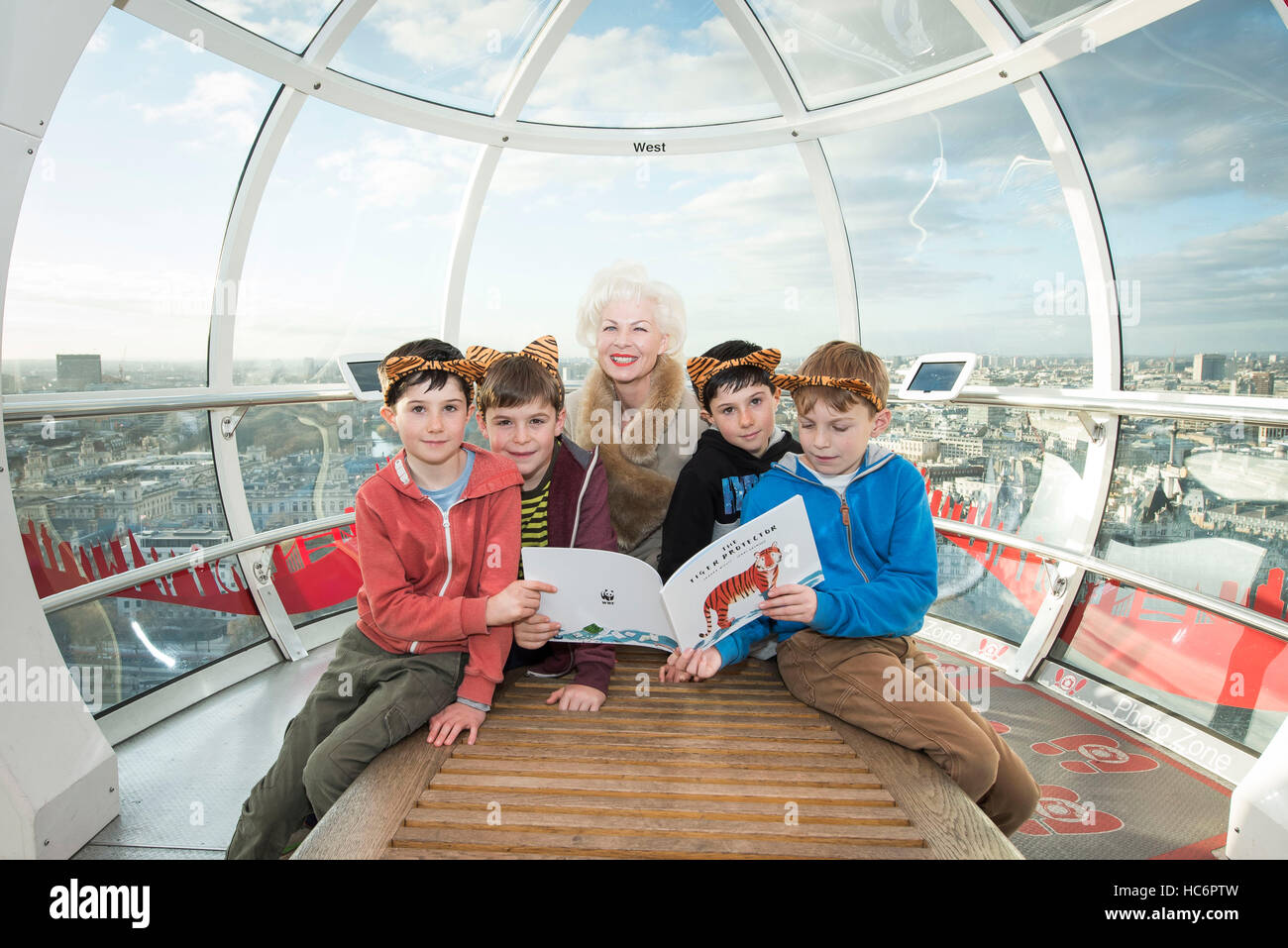 Jeanne Willis (centre, Author), competition winner Peter Salt (stripey ...