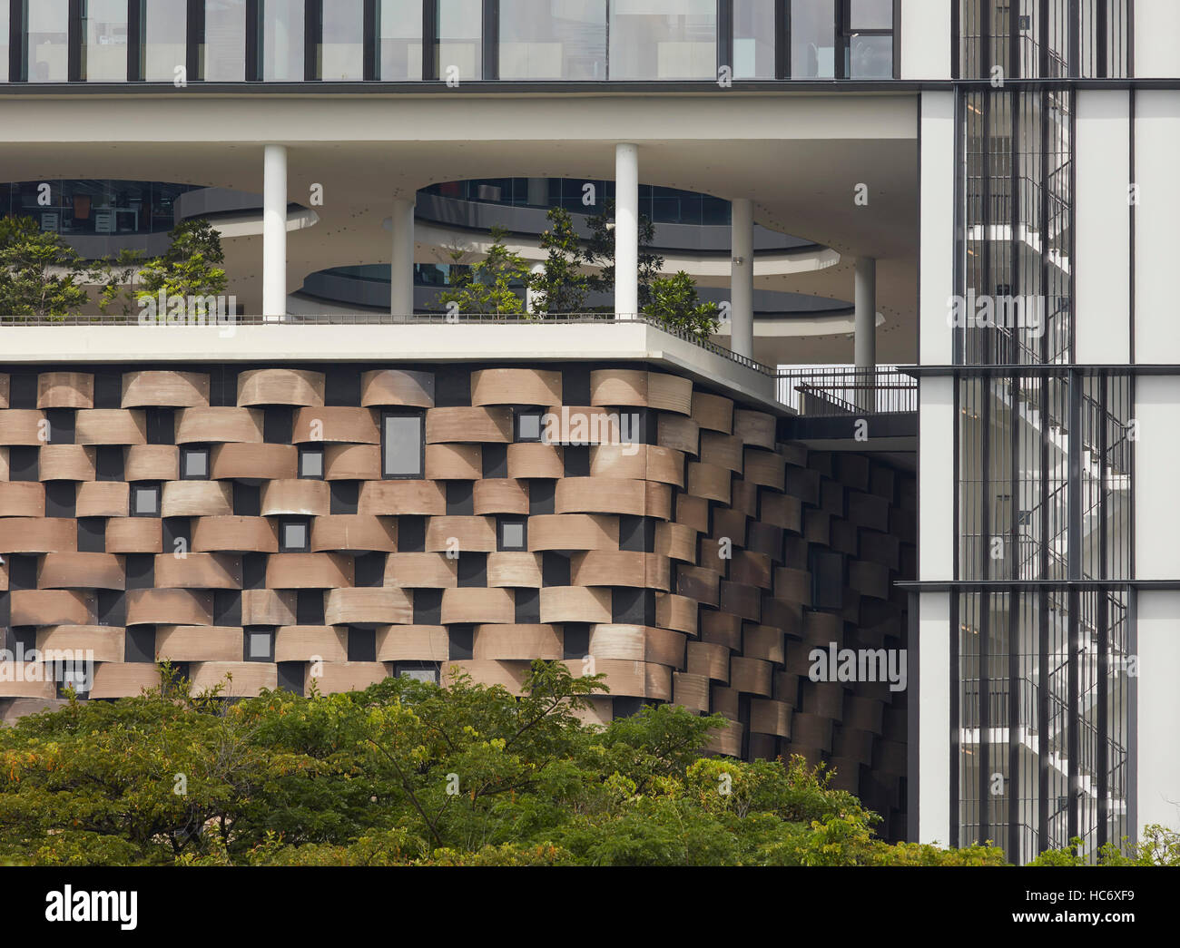 Detail of ceramic clad exterior facade and rooftop terrace. SELECT ...