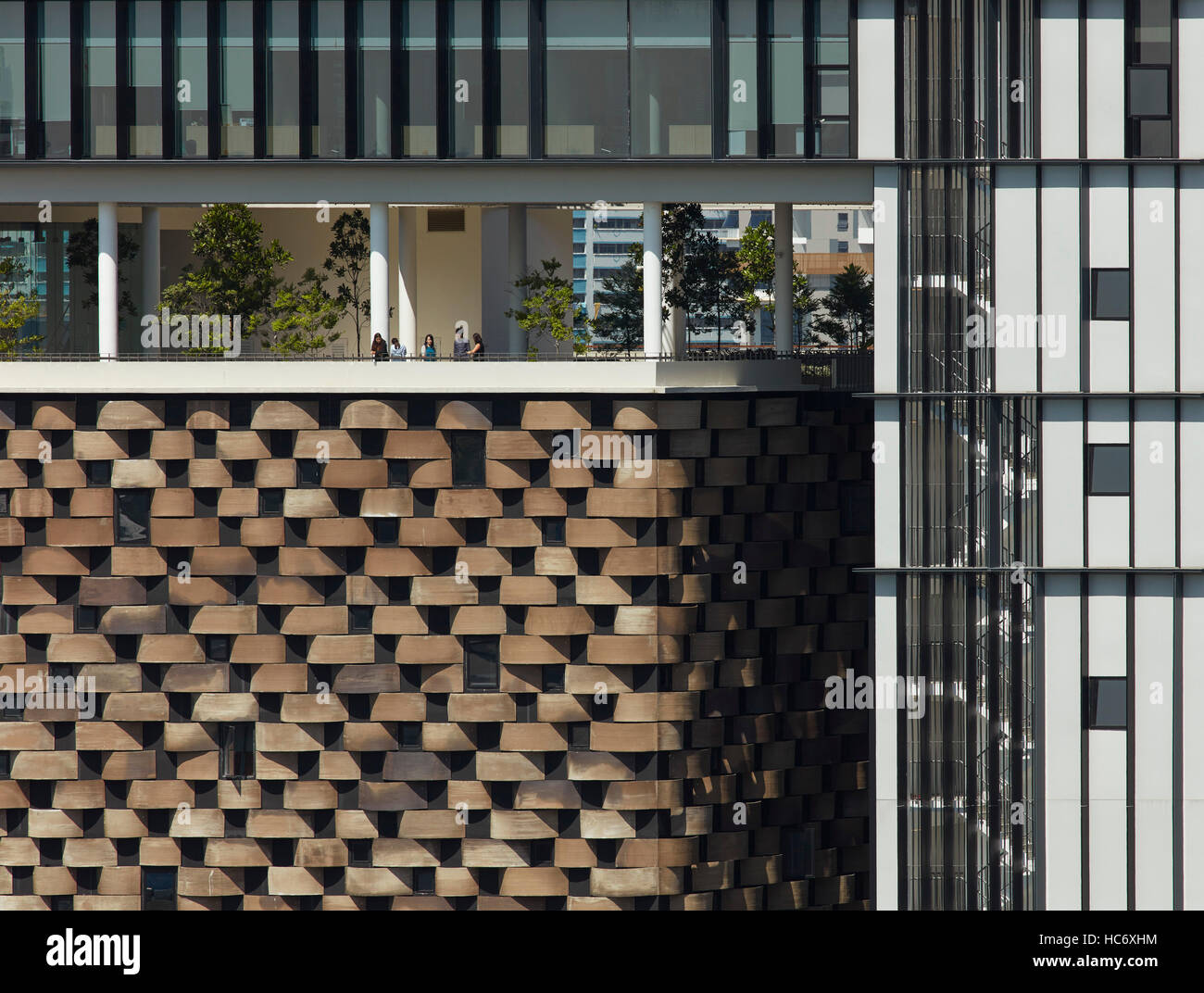 Detail of ceramic clad exterior facade and rooftop terrace. SELECT ...