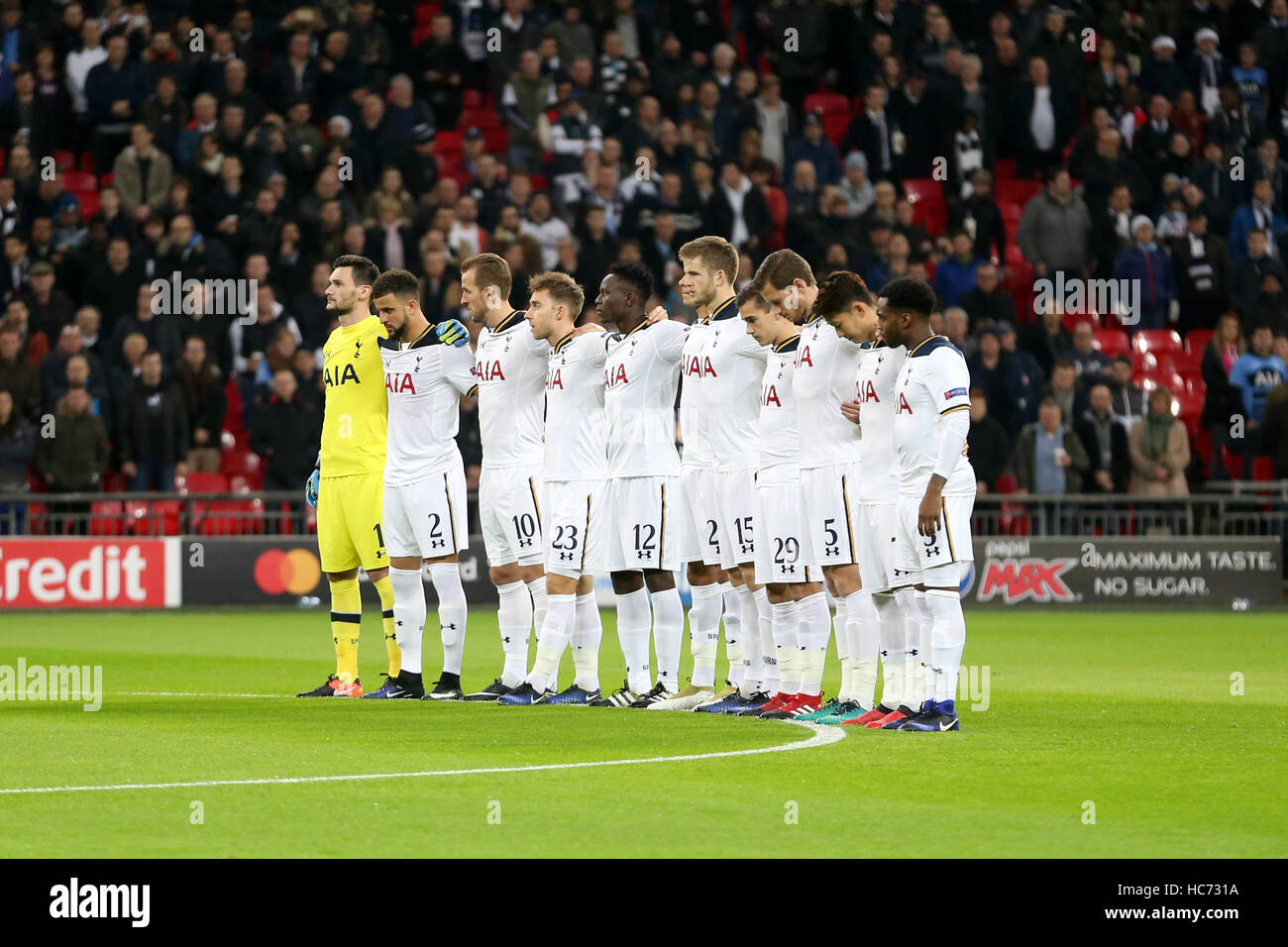 Tottenham Hotspur players observe a minutes silence in honour of the ...