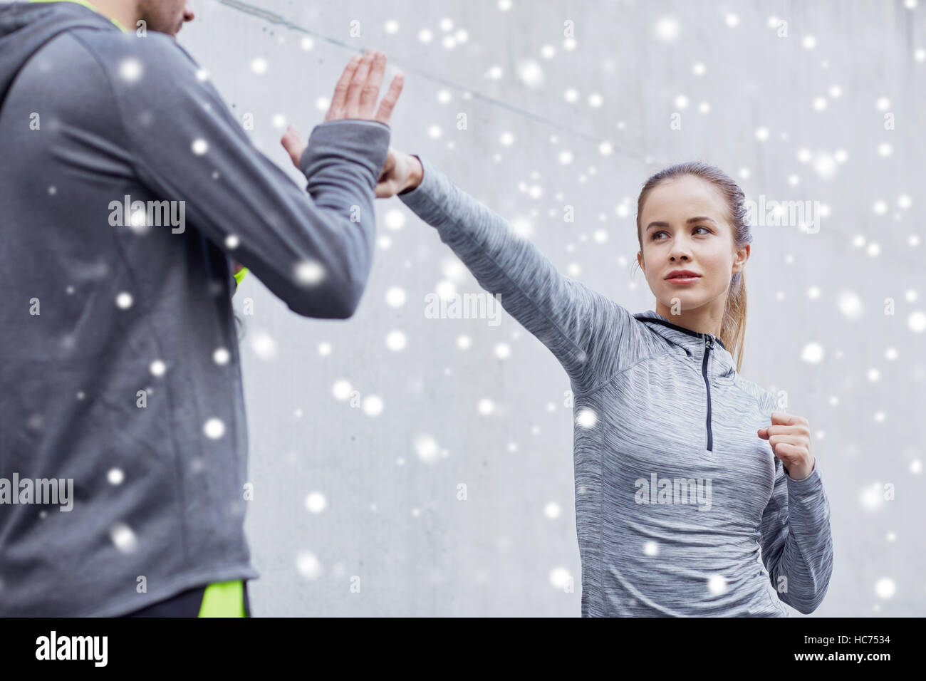 woman with coach working out strike outdoors Stock Photo - Alamy
